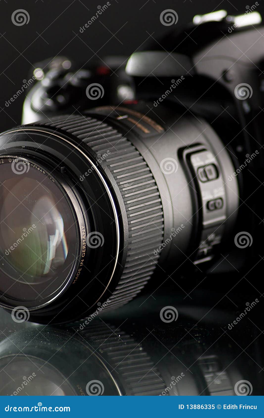 Photo camera on a table stock image. Image of isolated - 13886335