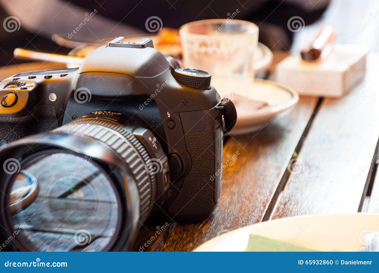 Photo camera on a table stock photo. Image of technology - 65932860