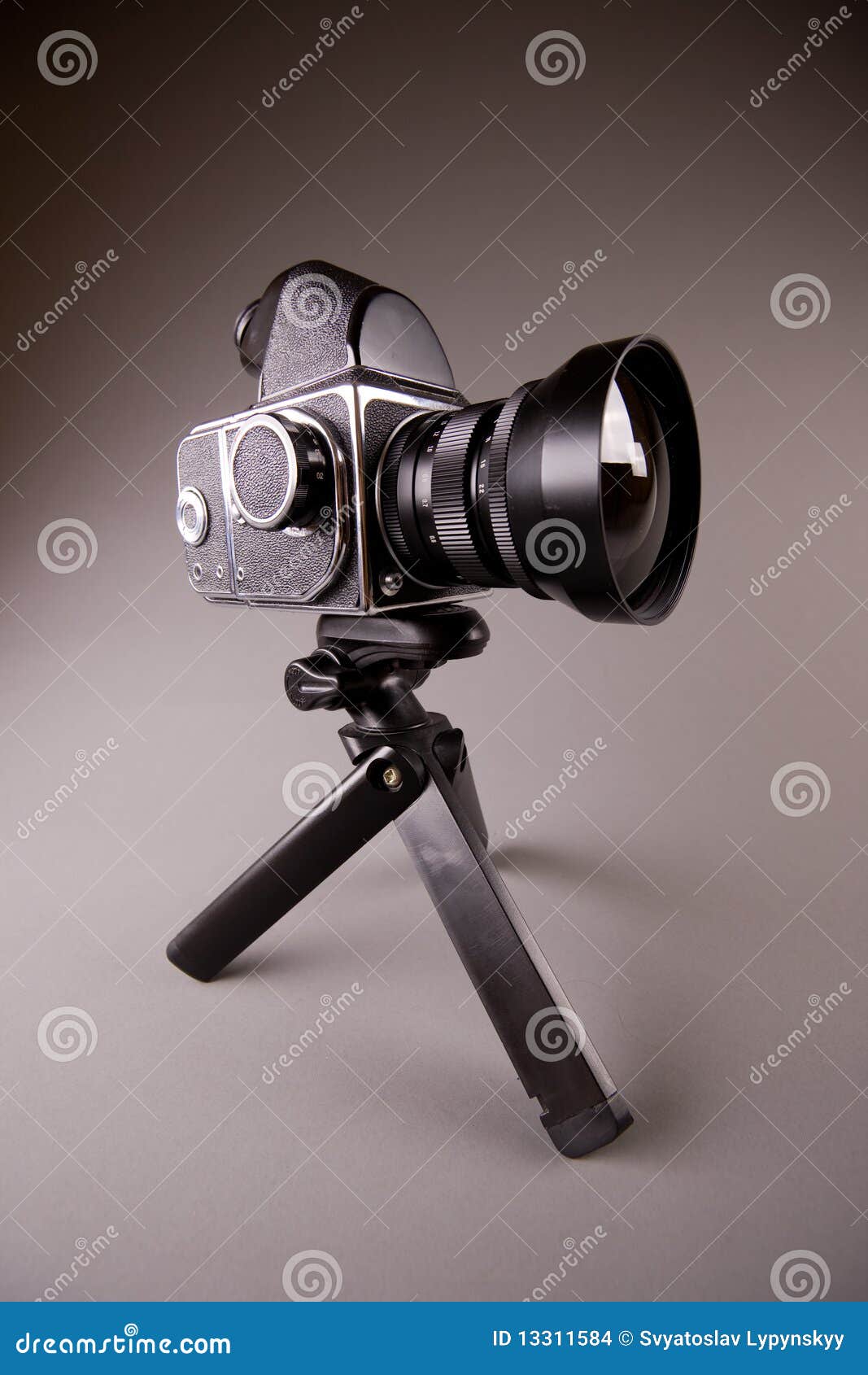 Photo Camera with Tripod on Grey in Hi-Res Stock Photo - Image of ...
