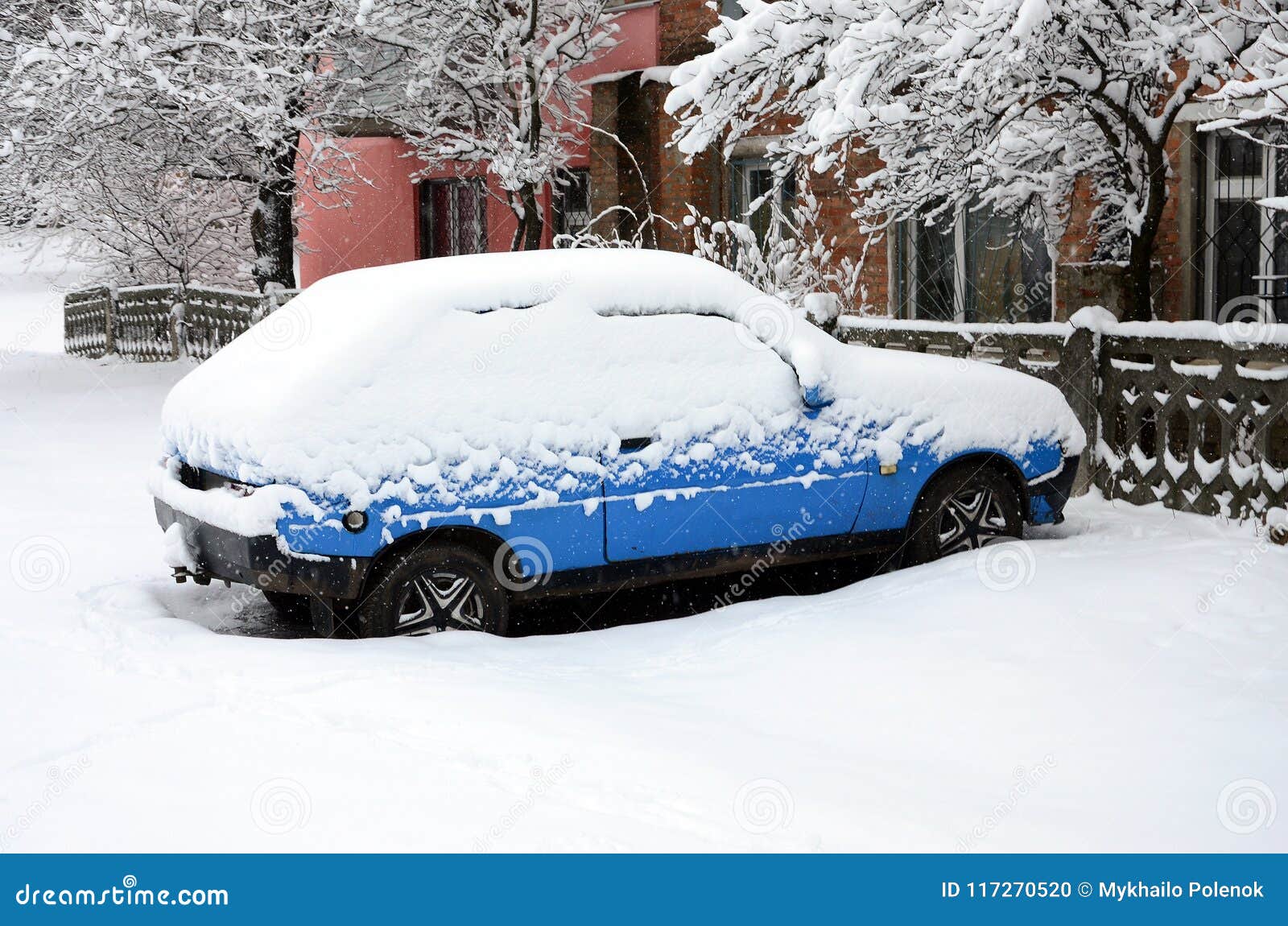 Photo of a Car Covered in a Thick Layer of Snow. Consequences of Heavy ...