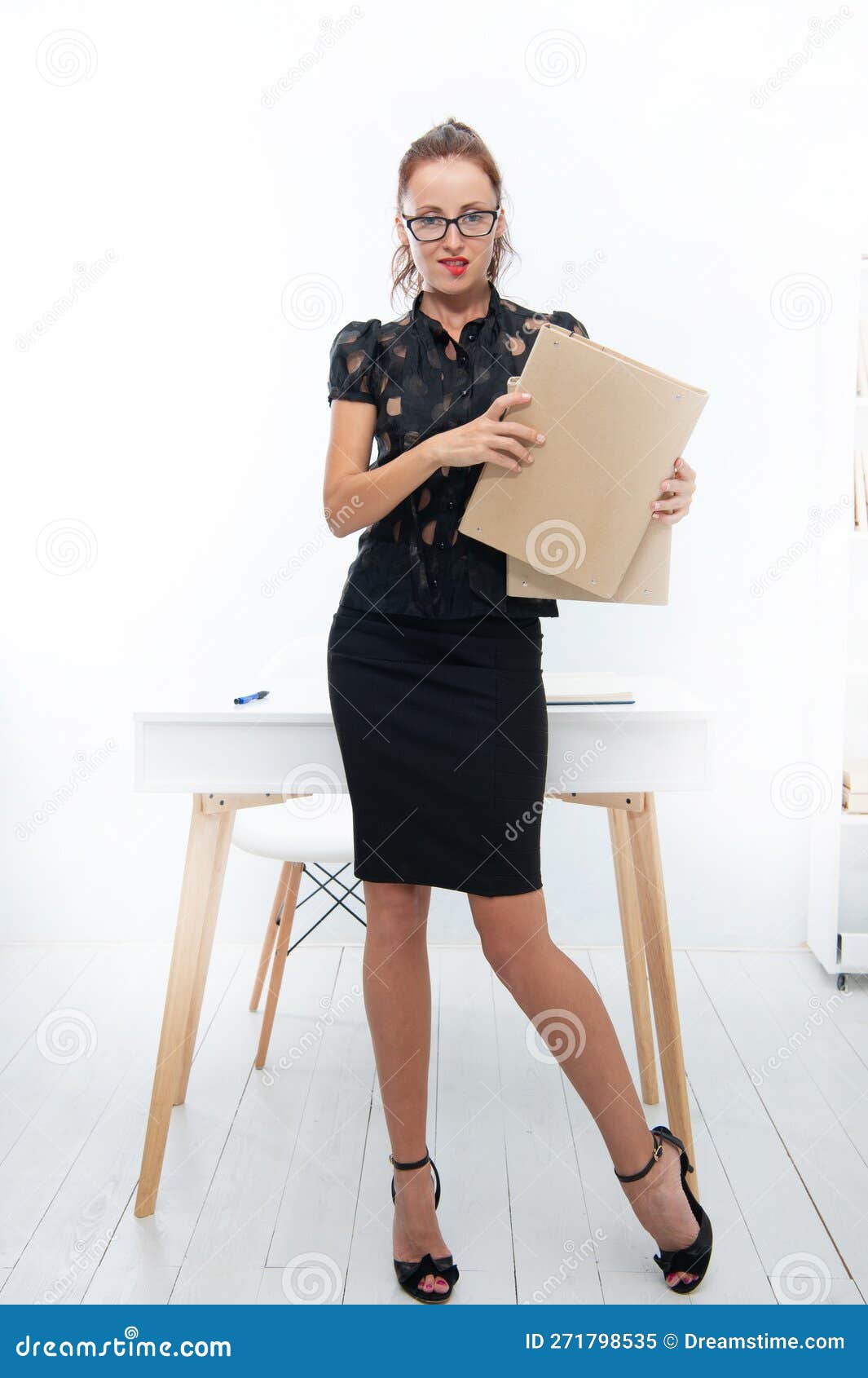 Photo Of Caucasian Boss Assistant With Folder Boss Assistant In Office Stock Image Image Of