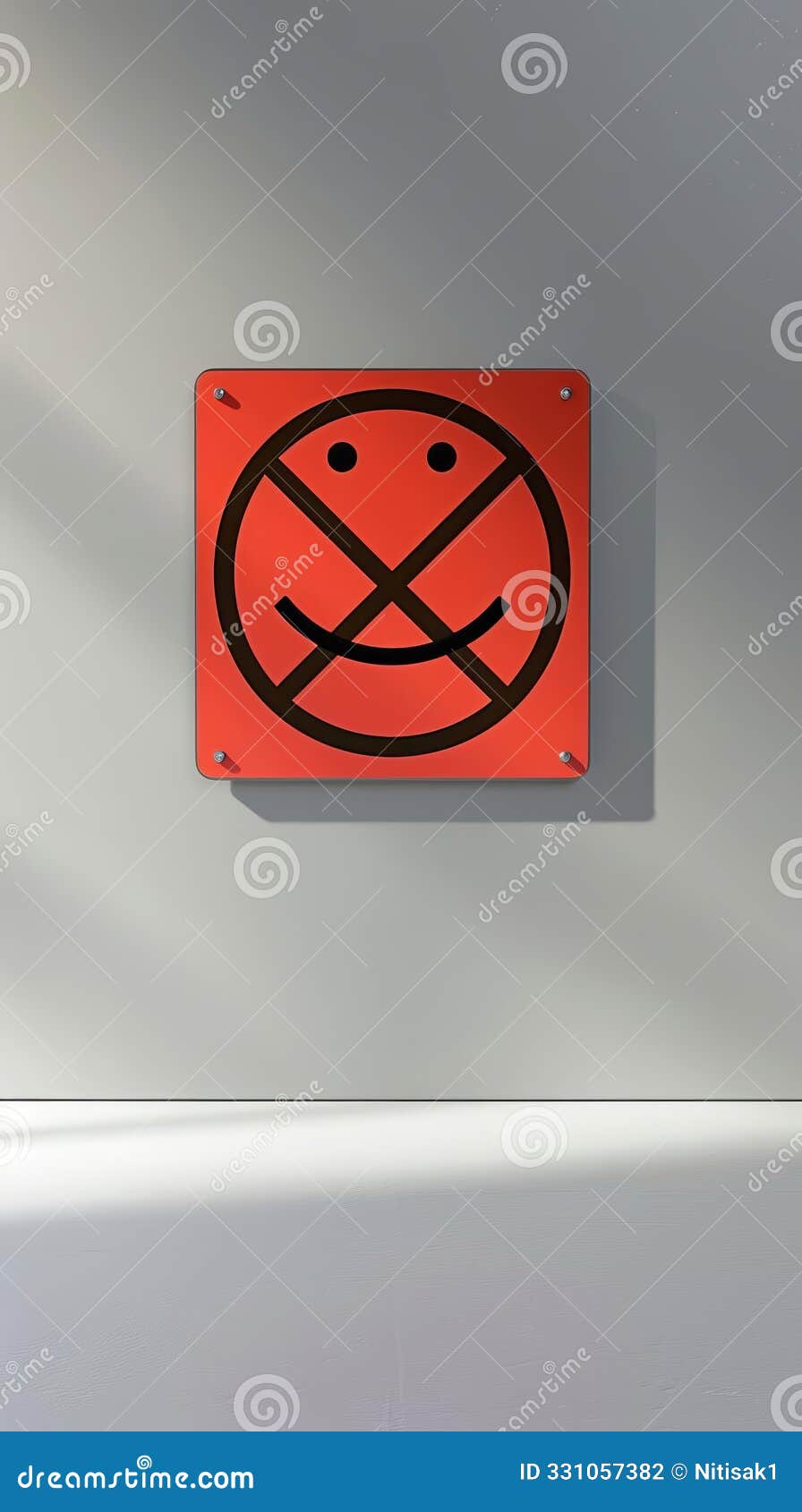 Photo of a Cautionary Sign Indicating No Smiling Allowed Against a ...