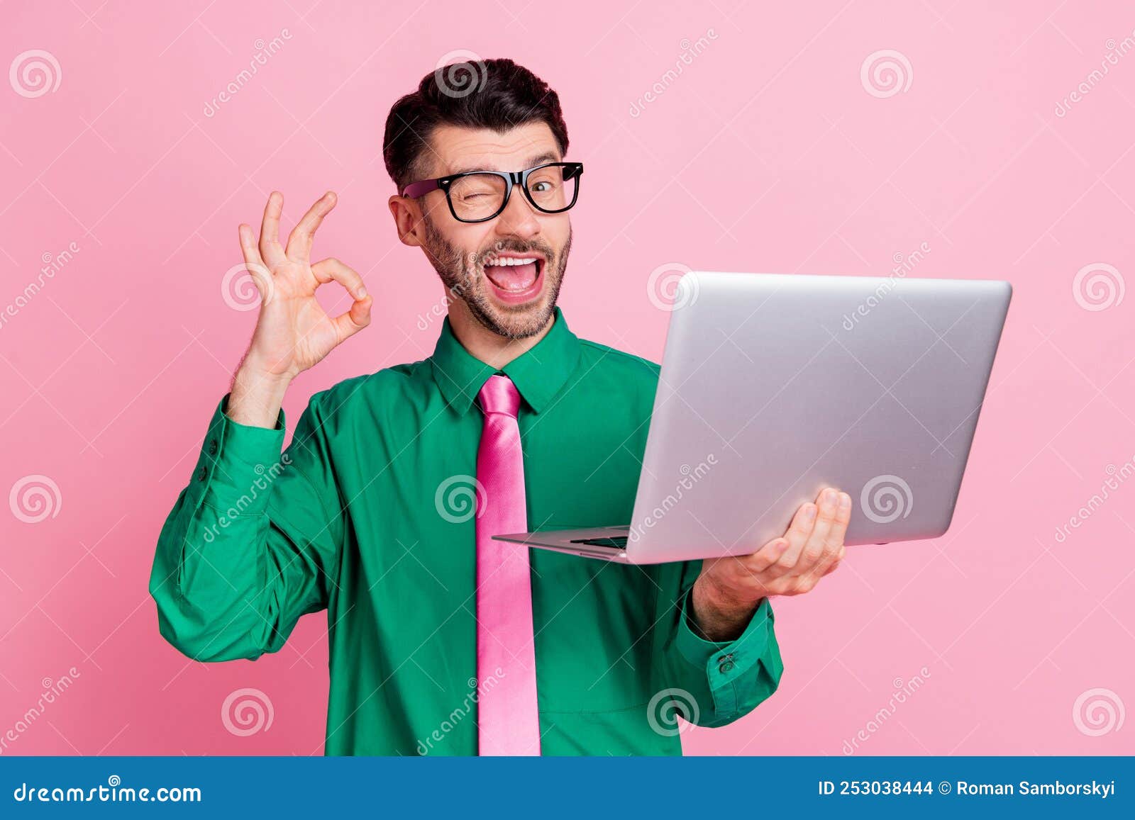 Photo Of Cheerful Funny Man Dressed Green Shirt Eyewear Winking Showing