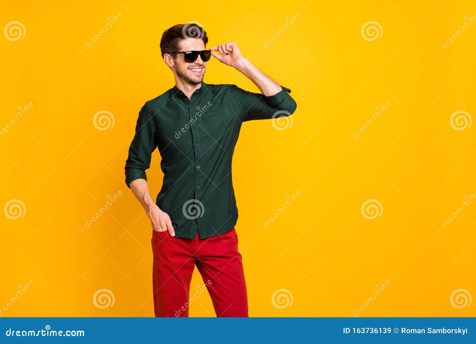 Photo Of Cheerful Positive Nice Cool Man Holding Sunglass Eyewear Specs
