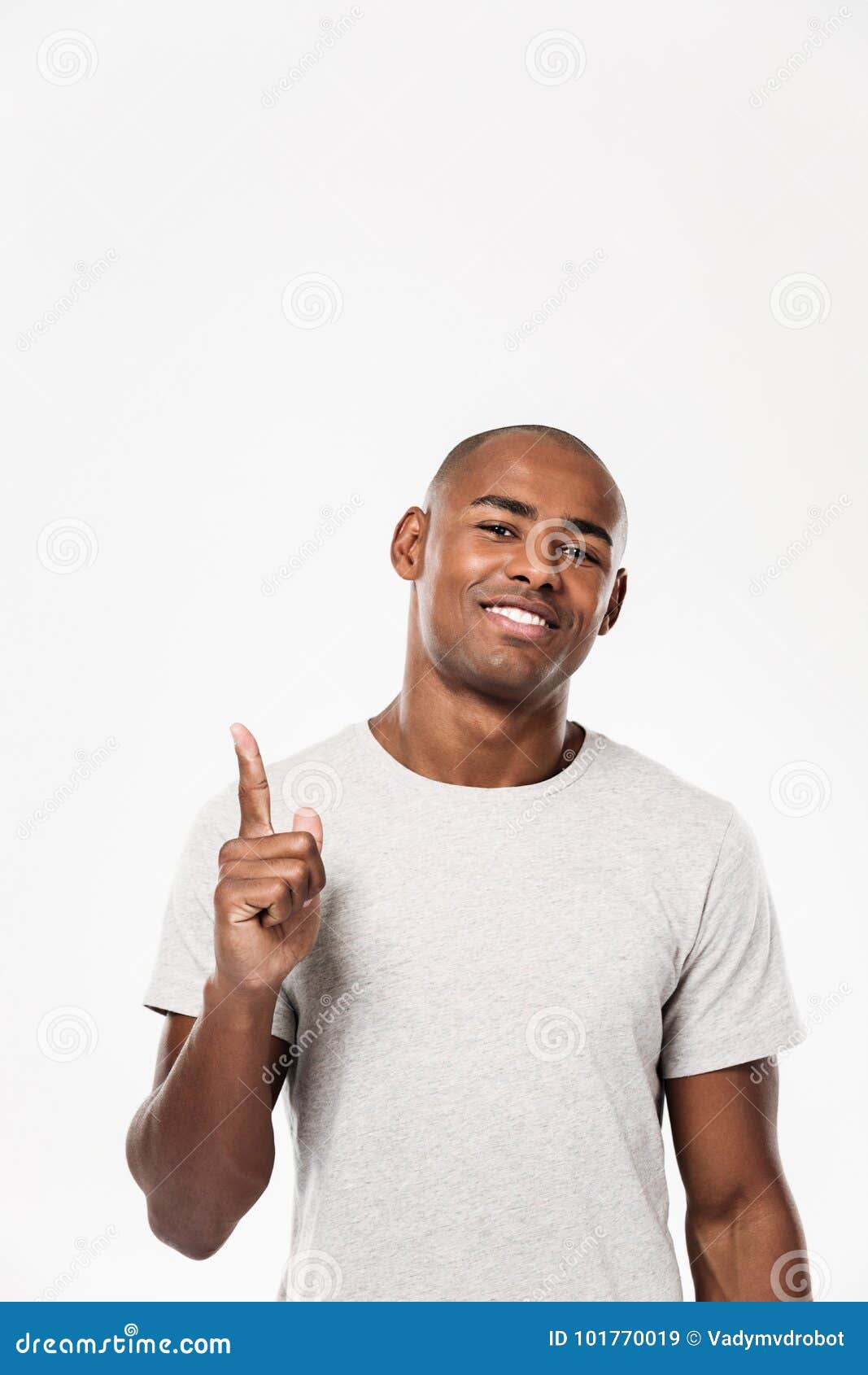 Cheerful Young African Man Pointing. Stock Image - Image of emotion ... Cheerful Young African Man Pointing. Stock Image - Image of emotion ...