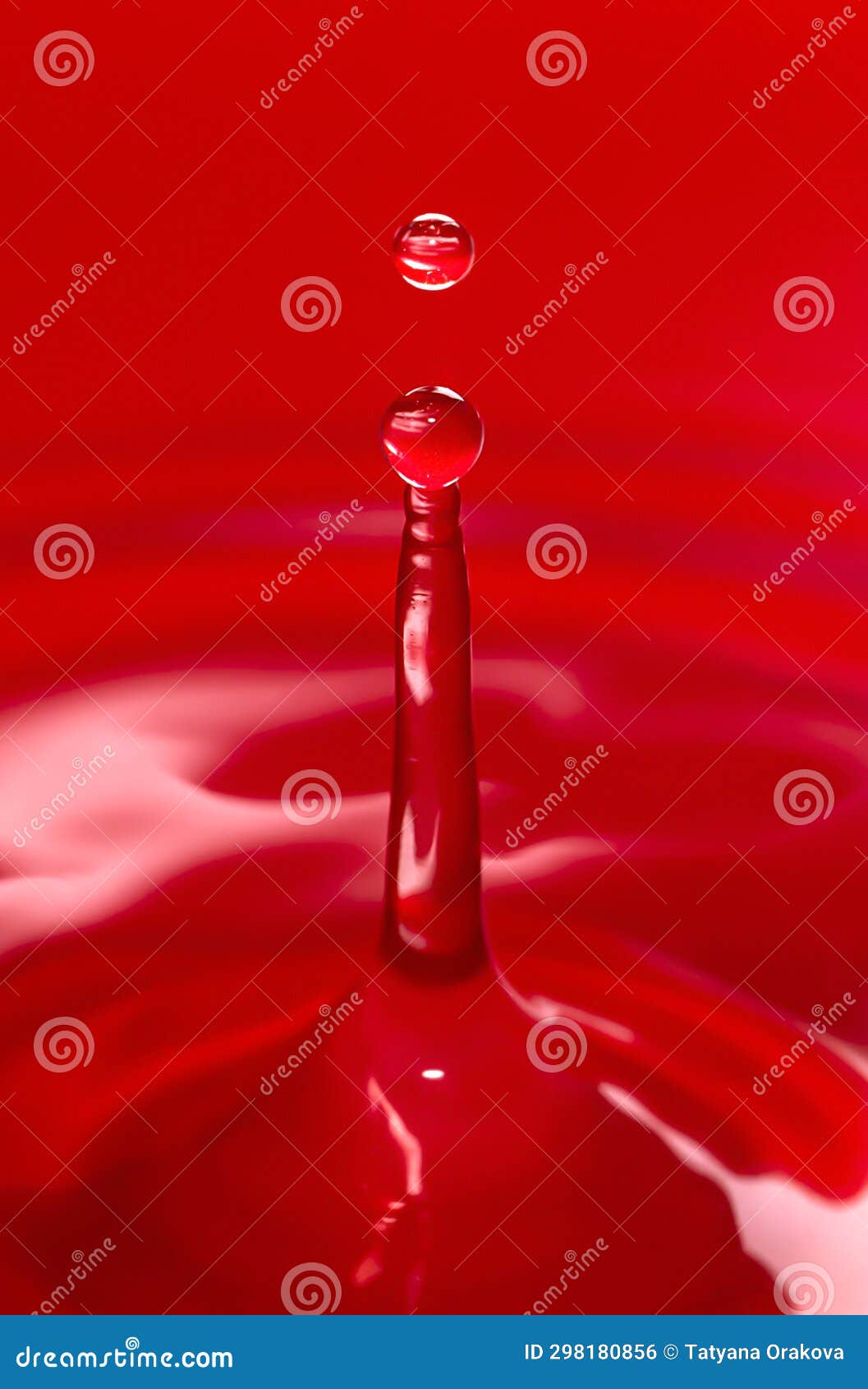 Photo of Circles on the Water from a Falling Drop of Water. Red ...