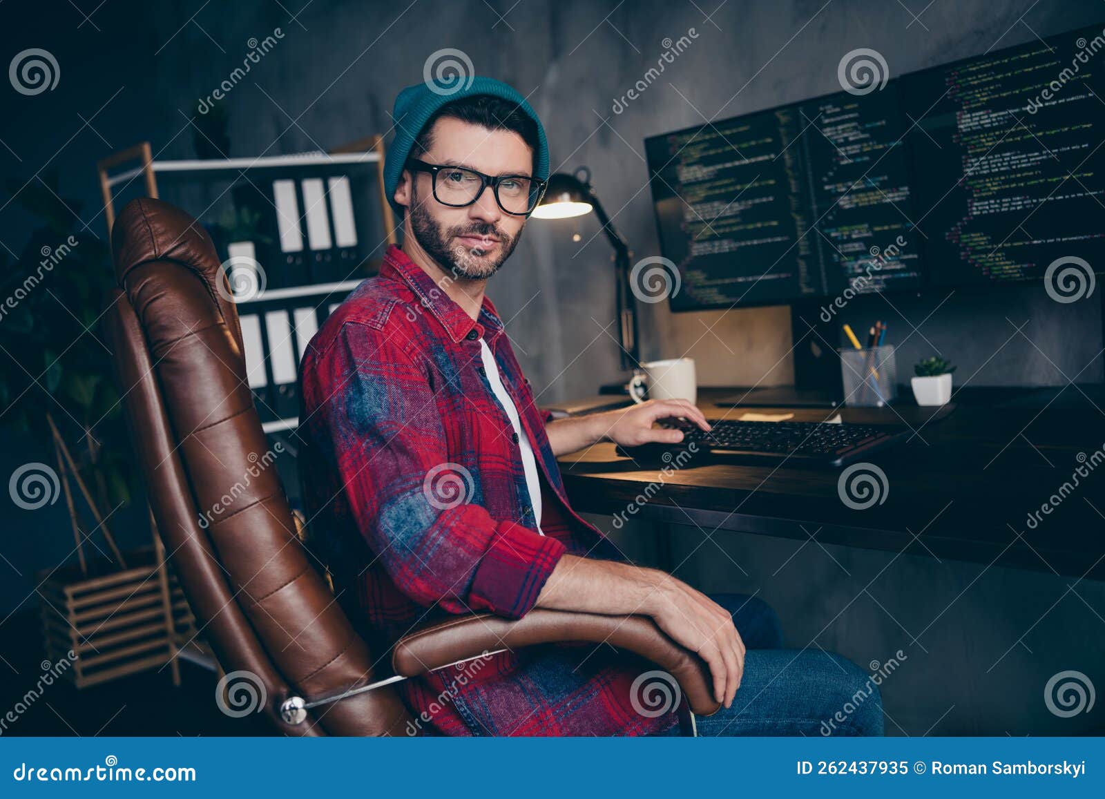 Photo of Clever Positive Coder Dressed Hat Glasses Creating Web Design ...