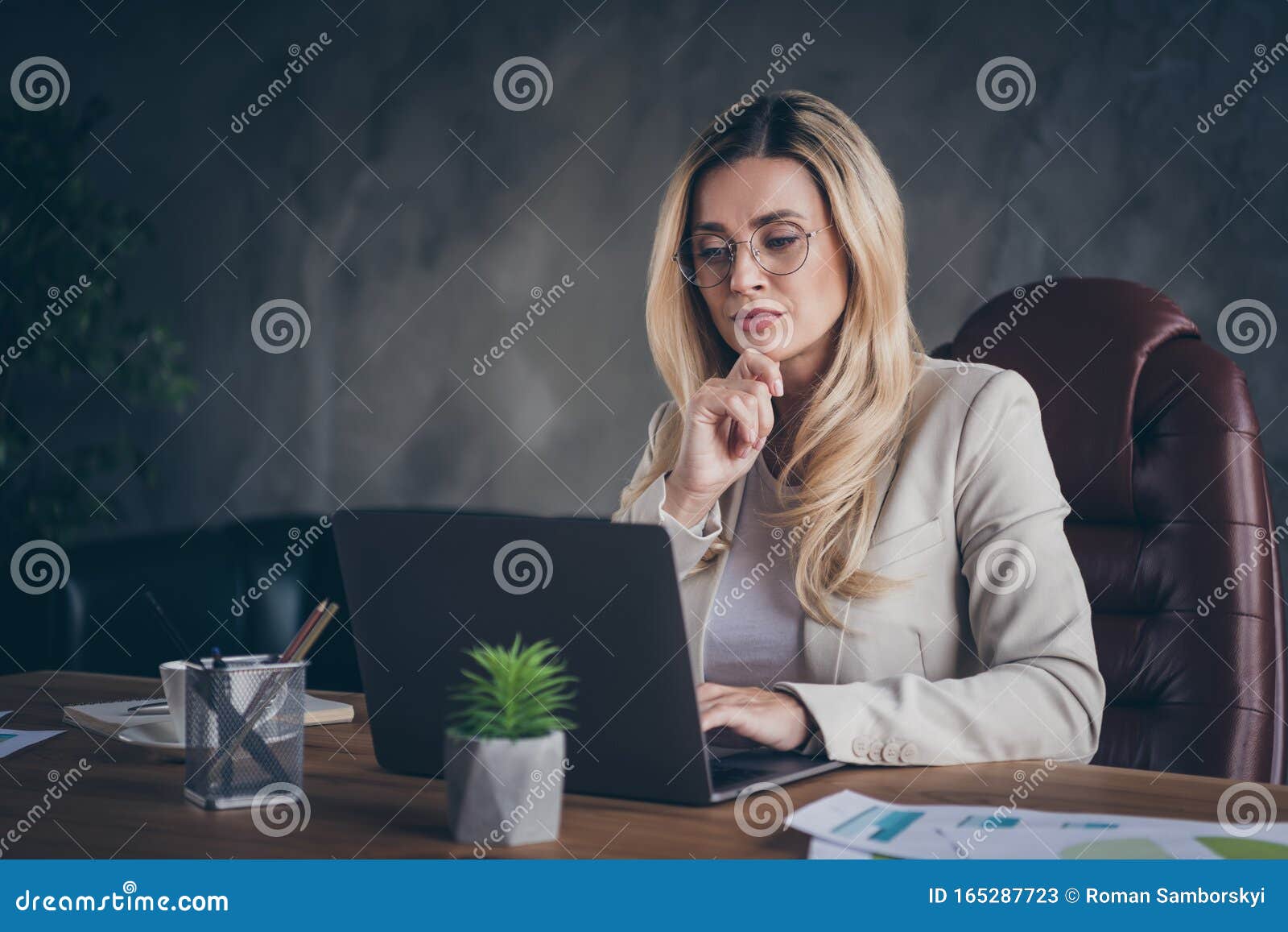 Photo of Concentrated Confident Smart Clever Lady Solving Buciness ...