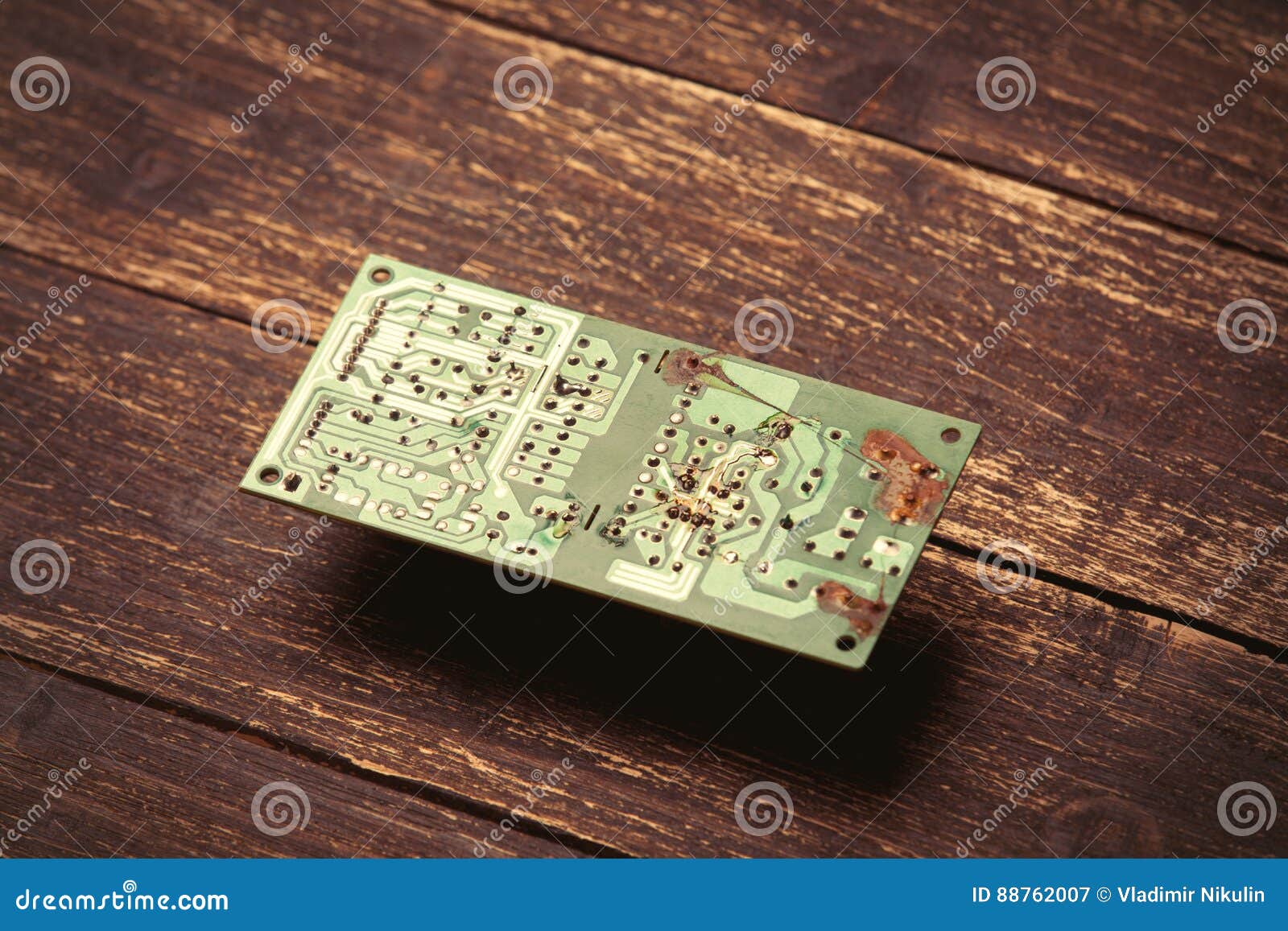 Photo of Cool Small Modern Microchip on the Wooden Brown Background ...