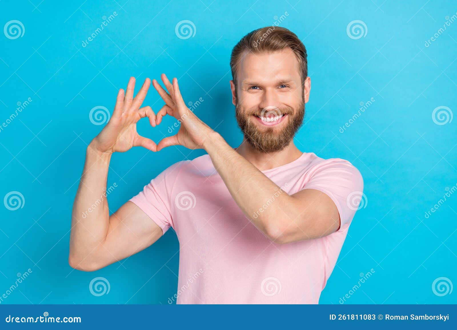 Photo Of Cool Sweet Young Guy Dressed Pink T Shirt Rising Arms Showing