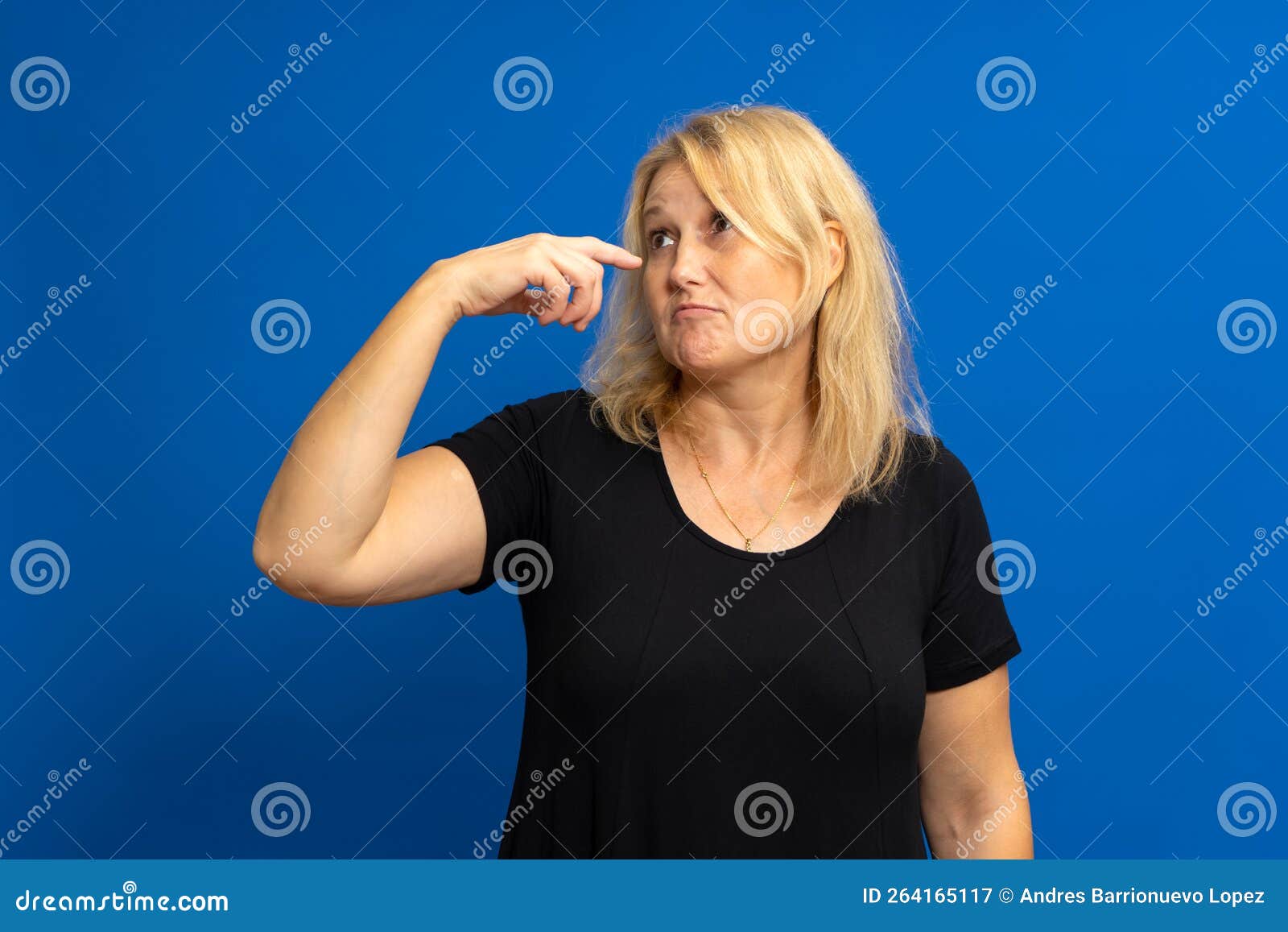 Photo Of Crazy Amazed Woman Pointing Index Finger At Herself Impressed