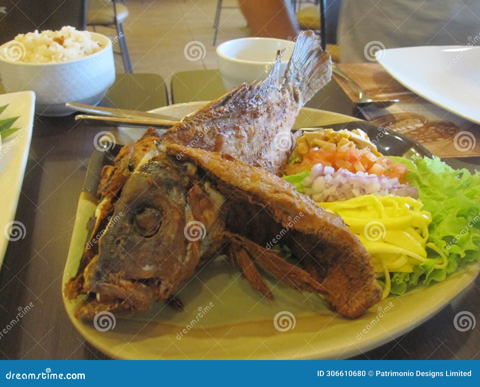 Photo of Crispy Deep Fried Whole Red Snapper Dish on Plate Stock Photo ...