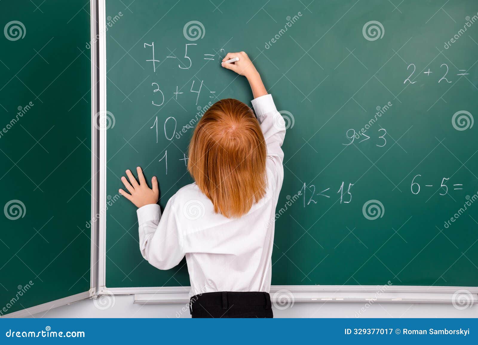 Photo of Cute Little Schoolboy Diligent Write Chalk Solve Math Problem ...