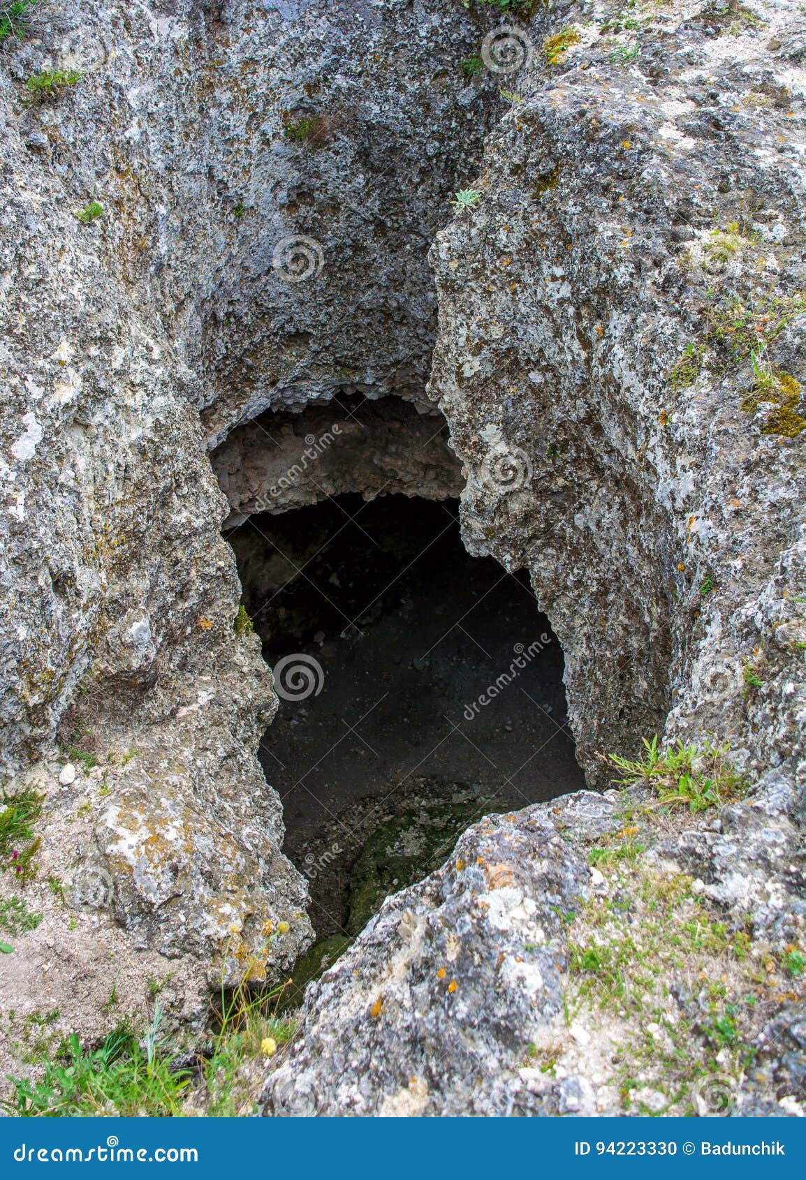 Photo of Dark Cave Hole in the Rock Stock Photo - Image of caving ...