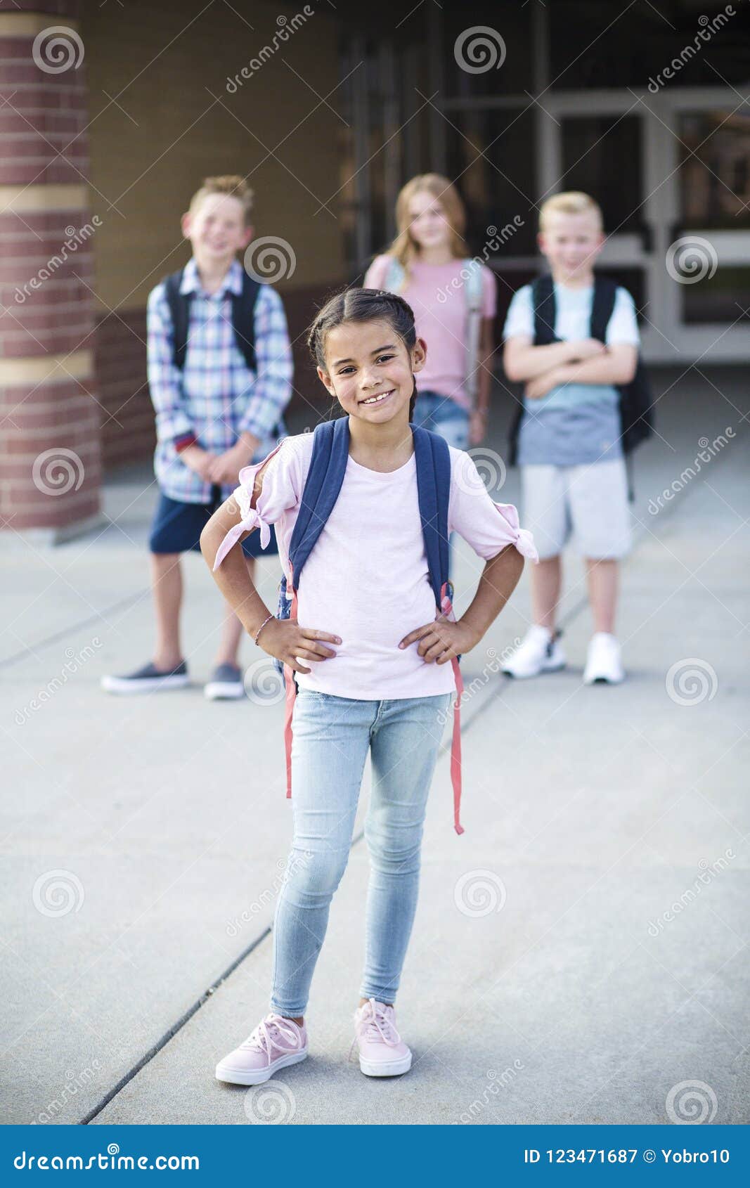 Portrait of a Group of Smiling Elementary School Students with ...