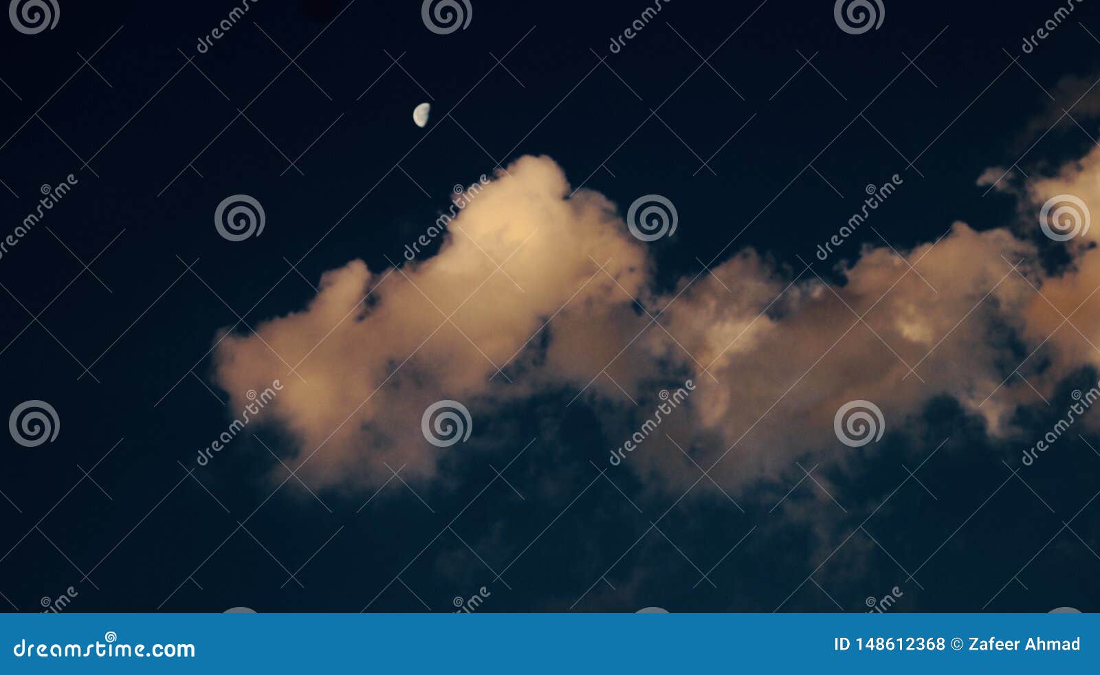 Dramatic clouds in the sky stock photo. Image of scene - 148612368