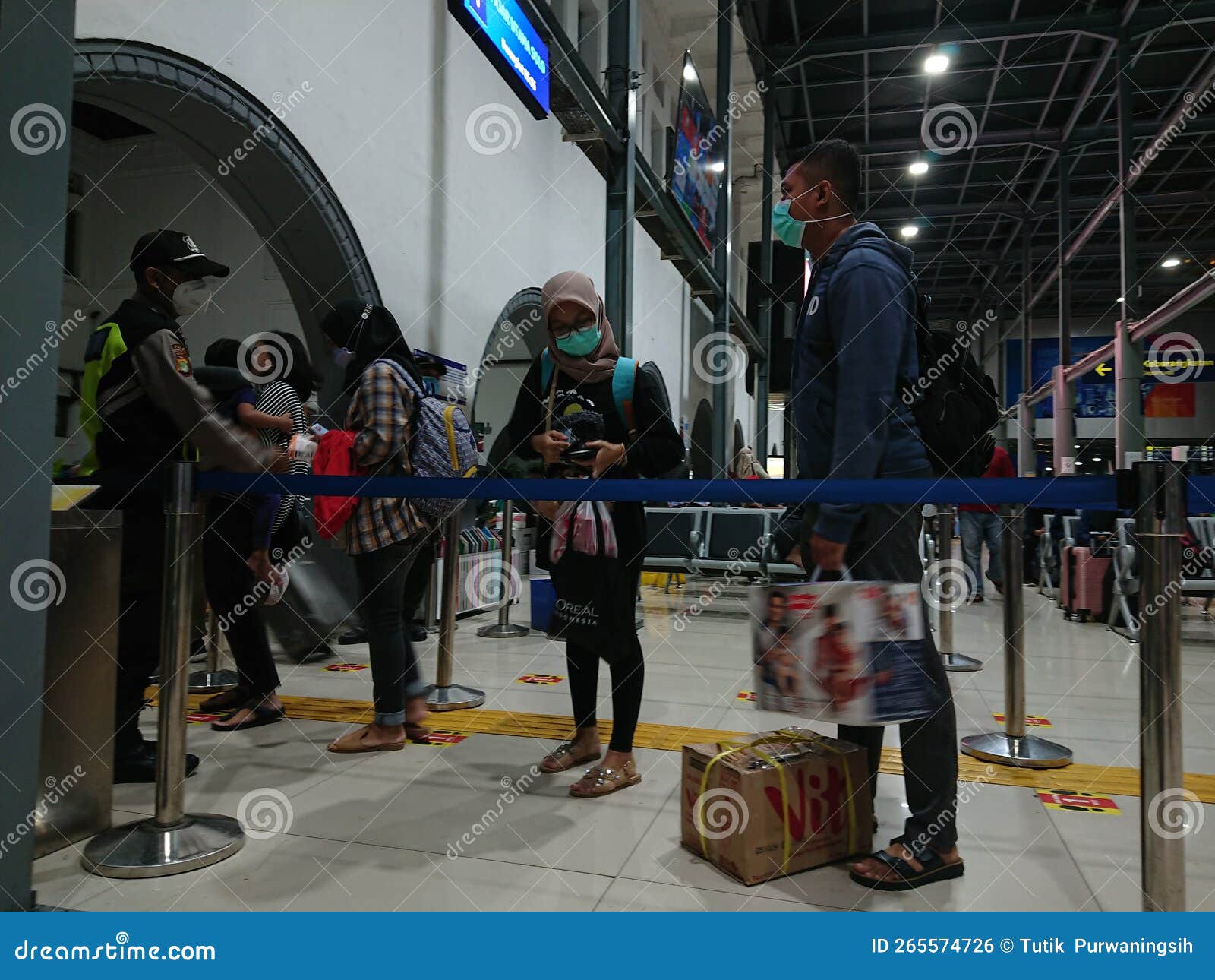 Photo Editorial, 07 November, Queueing People for Ticket Checking by ...