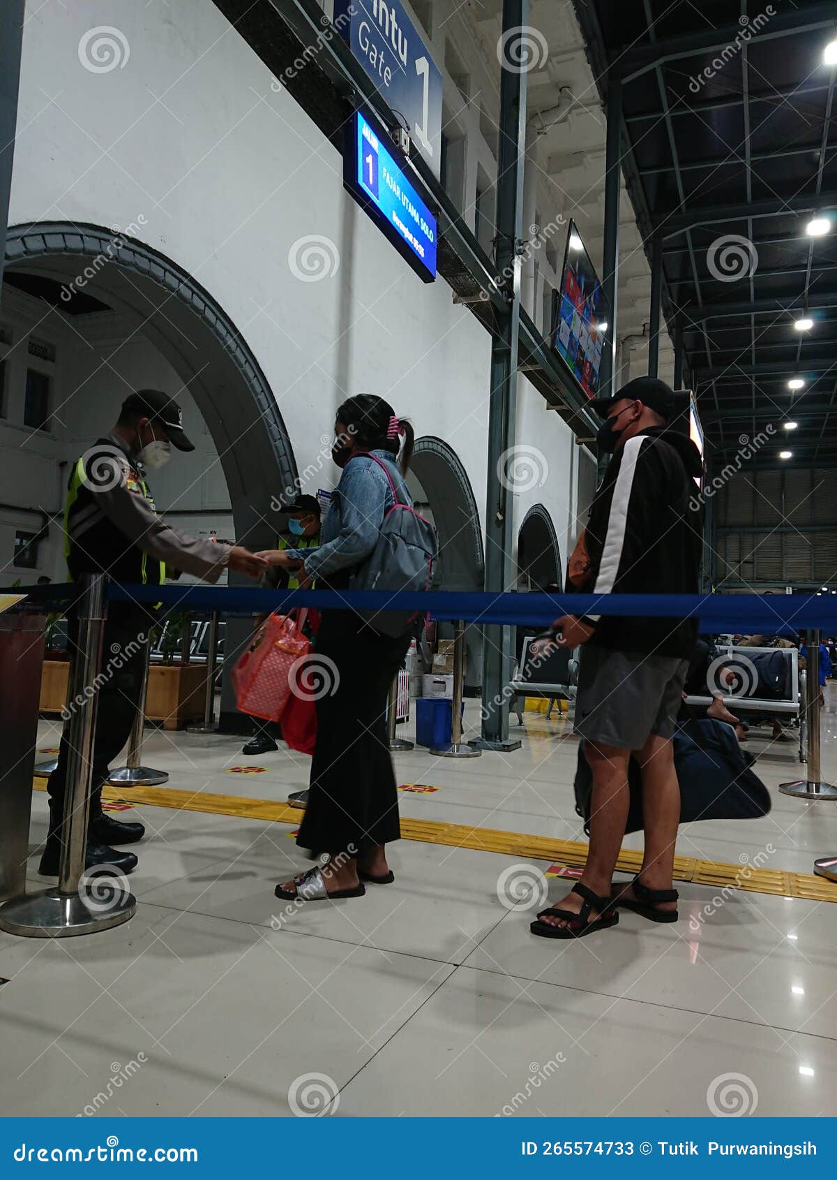 Photo Editorial, 07 November, Queueing People for Ticket Checking by ...