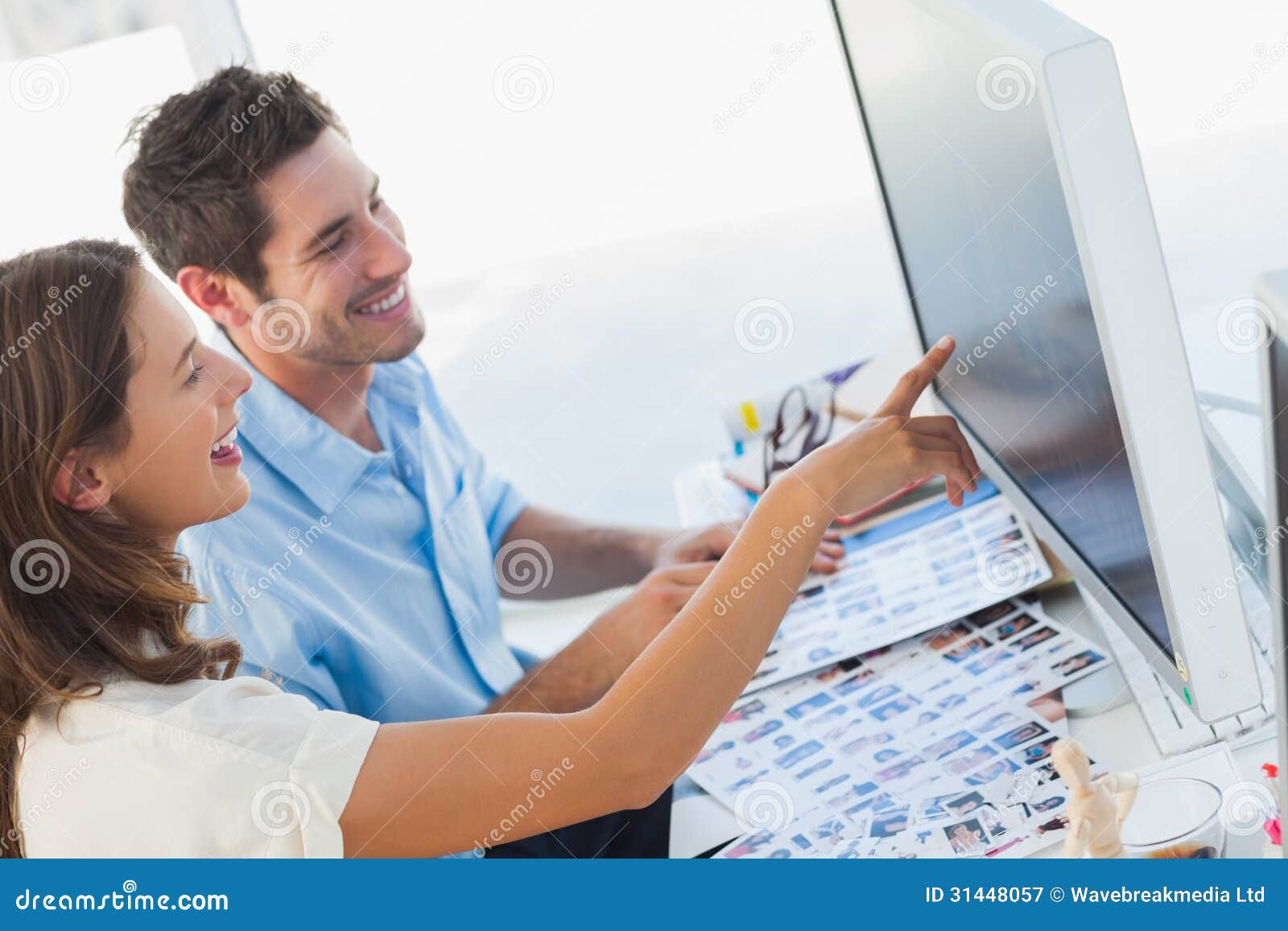 Photo Editors Pointing at a Computer Screen Stock Image - Image of ...