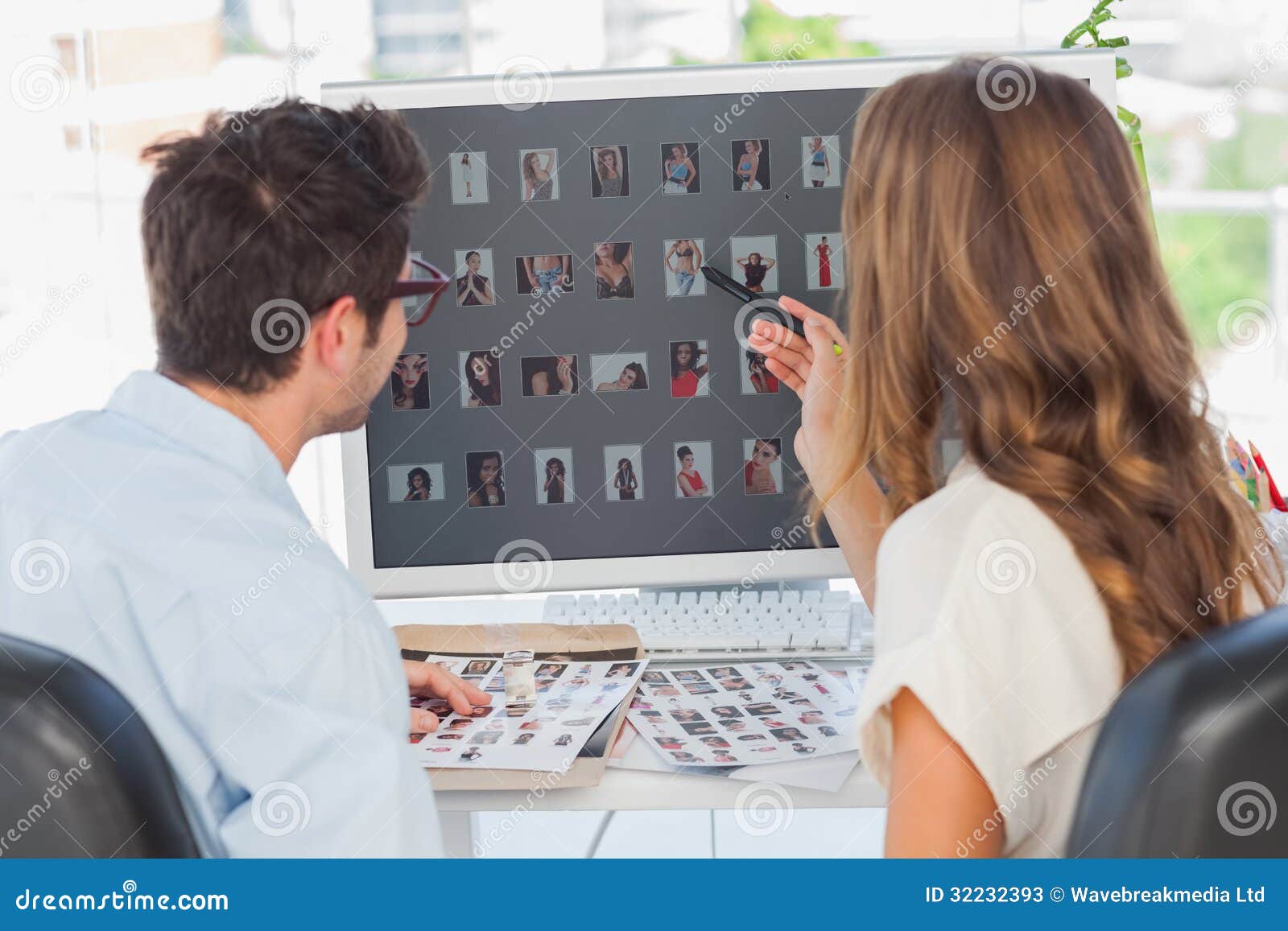 Photo Editors Working on Thumbnails Stock Image - Image of electronic ...
