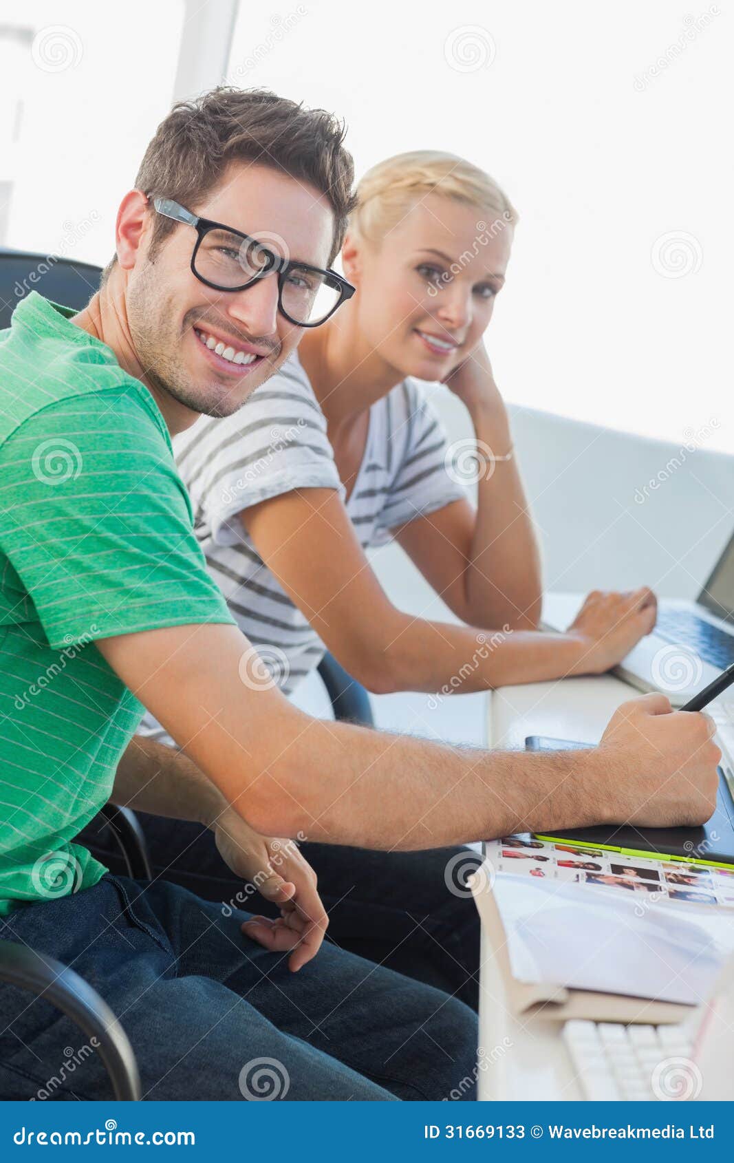 Photo Editors Working Together on Graphics Tablet Stock Image - Image ...