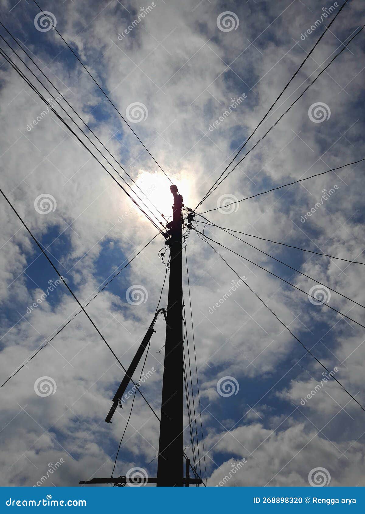 Photo of Electric Pole with Sunny Clouds Stock Photo - Image of line ...
