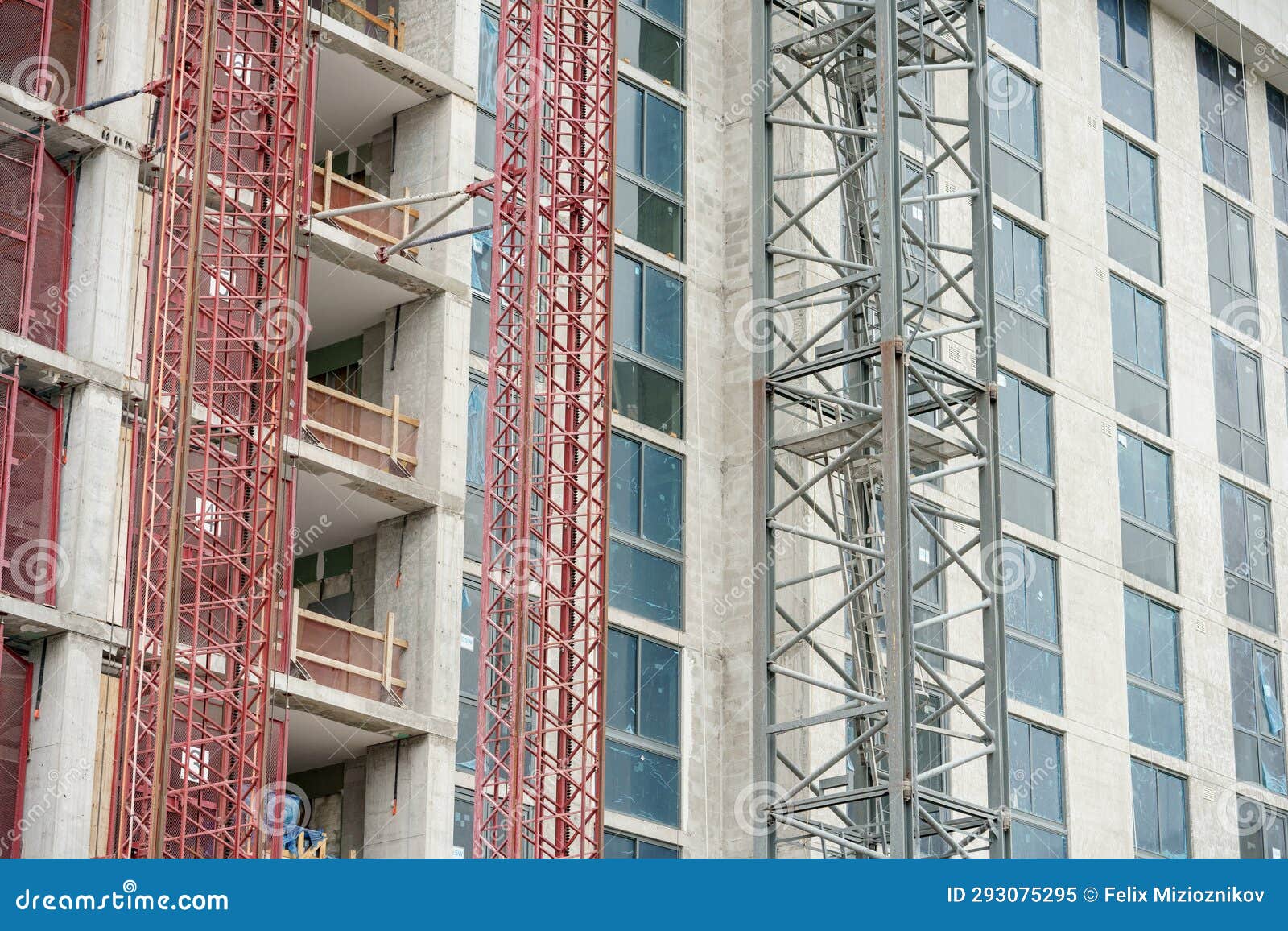 Photo of Elevator Lift and Crane Section Attached To a Building Under ...