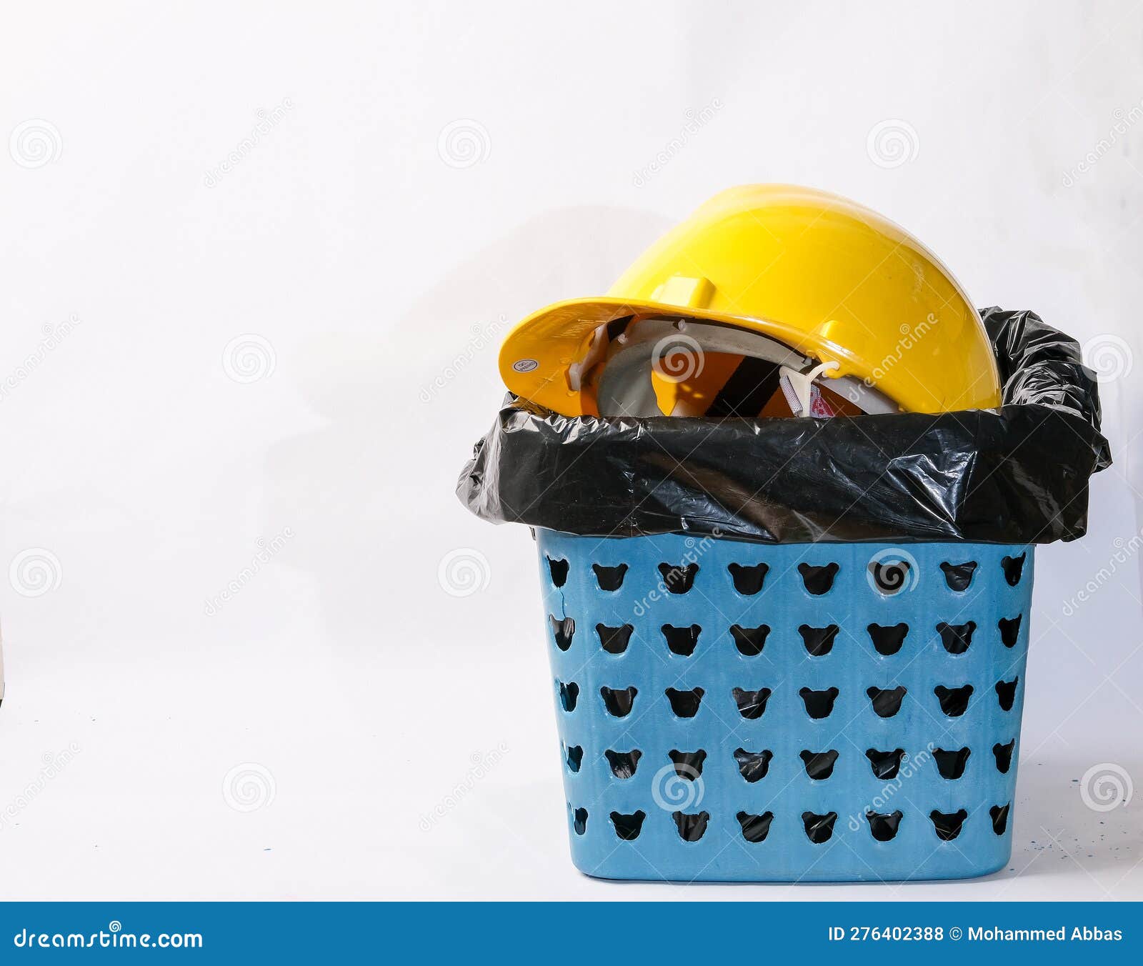 Engineer Helmet in a Plastic Trash Bin Stock Photo - Image of collector ...
