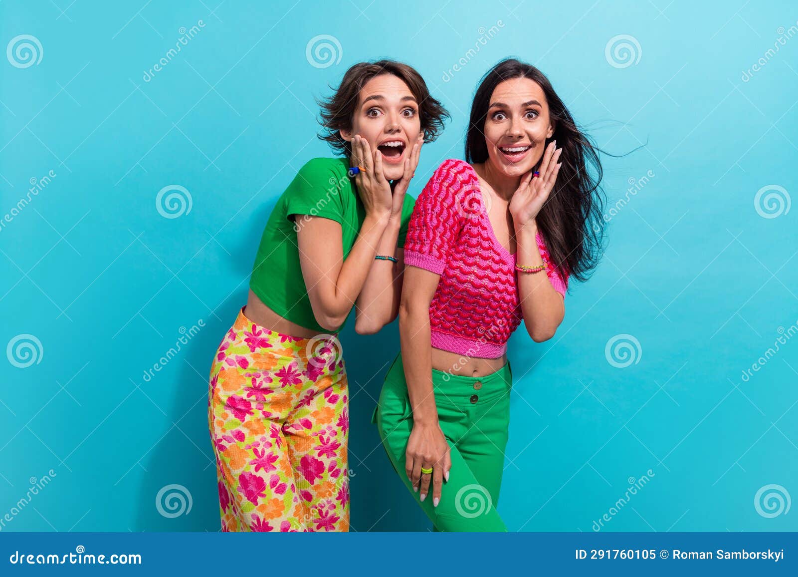 Photo Of Excited Impressed Girls Dressed Colorful Outfits Arms Cheeks