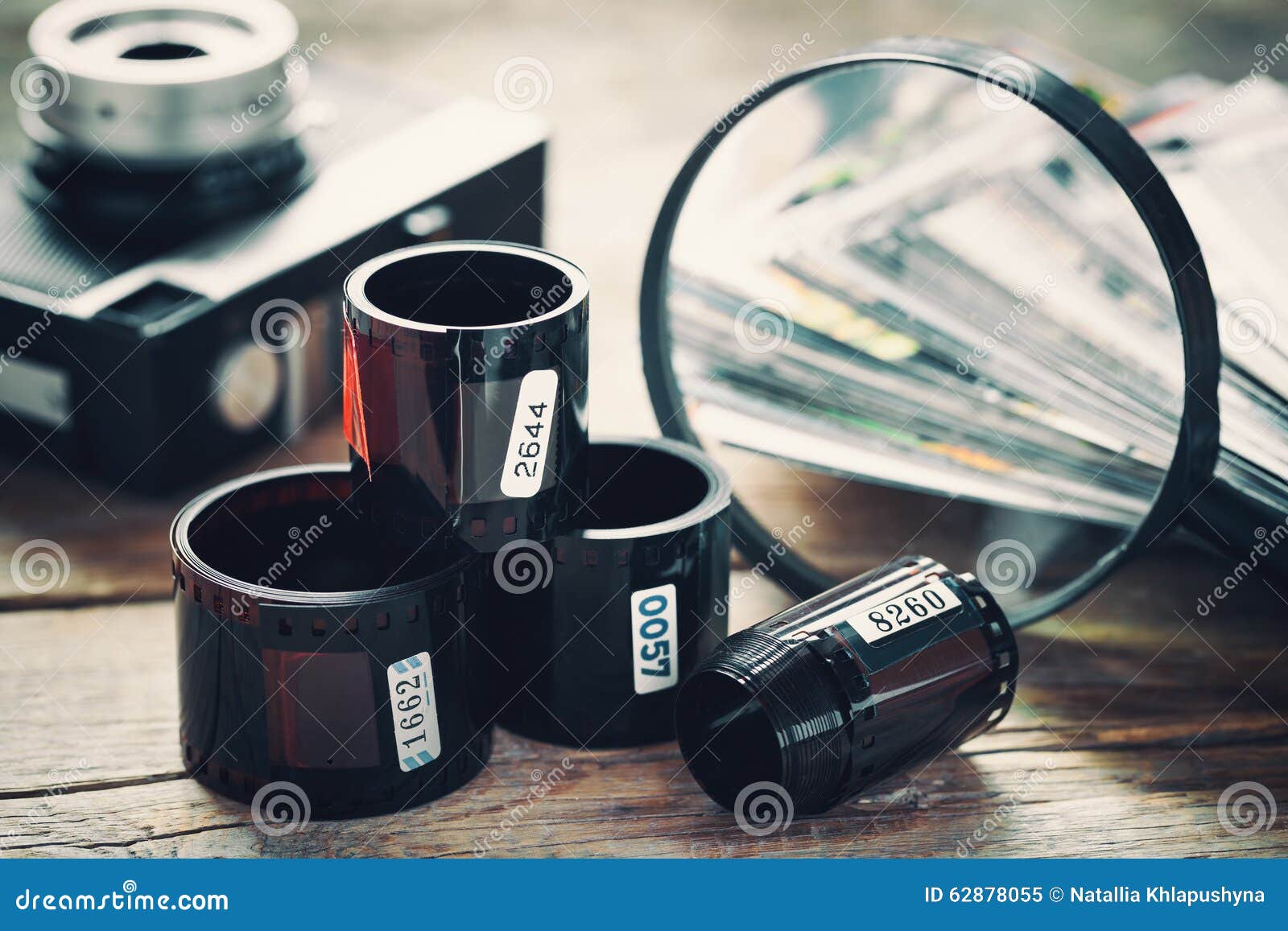 Photo Film Rolls, Retro Camera, Photos and Magnifier Stock Image ...
