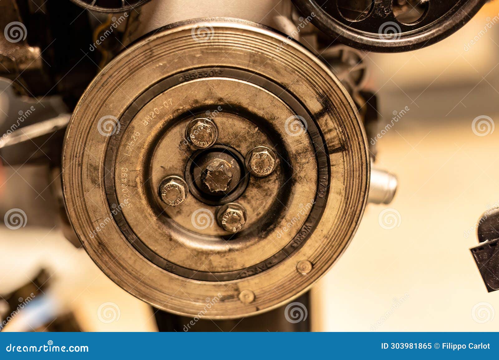 Photo Focusing on the Intricate Pulleys of a Car Engine Stock Image ...