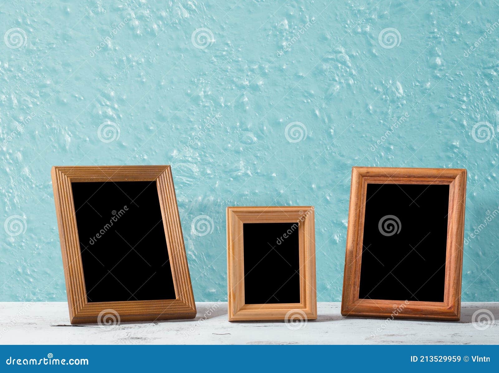Photo frames on table stock image. Image of frame, texture - 213529959