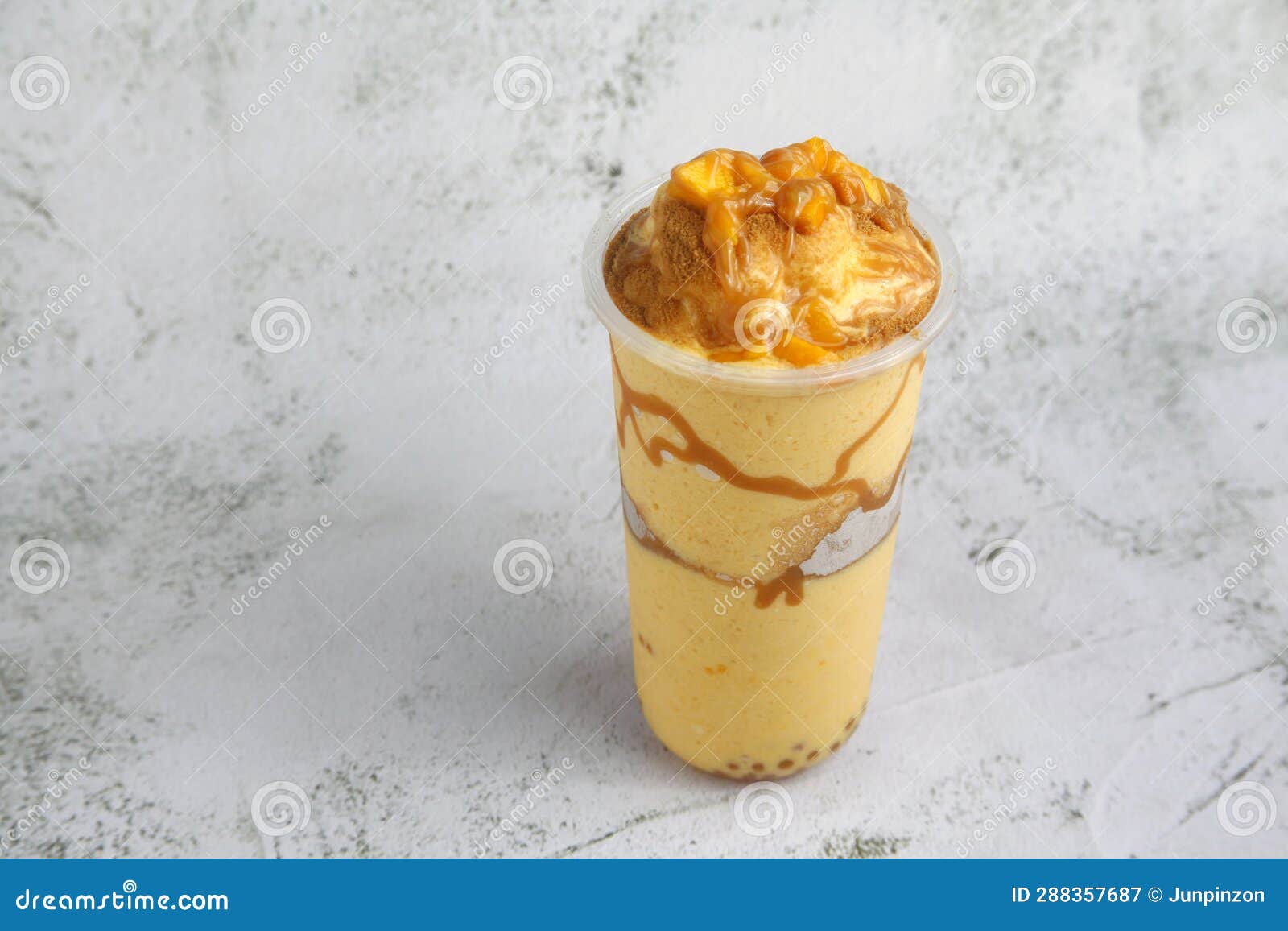 Cold Beverage Called Mango Graham Shake with Assorted Toppings Stock ...
