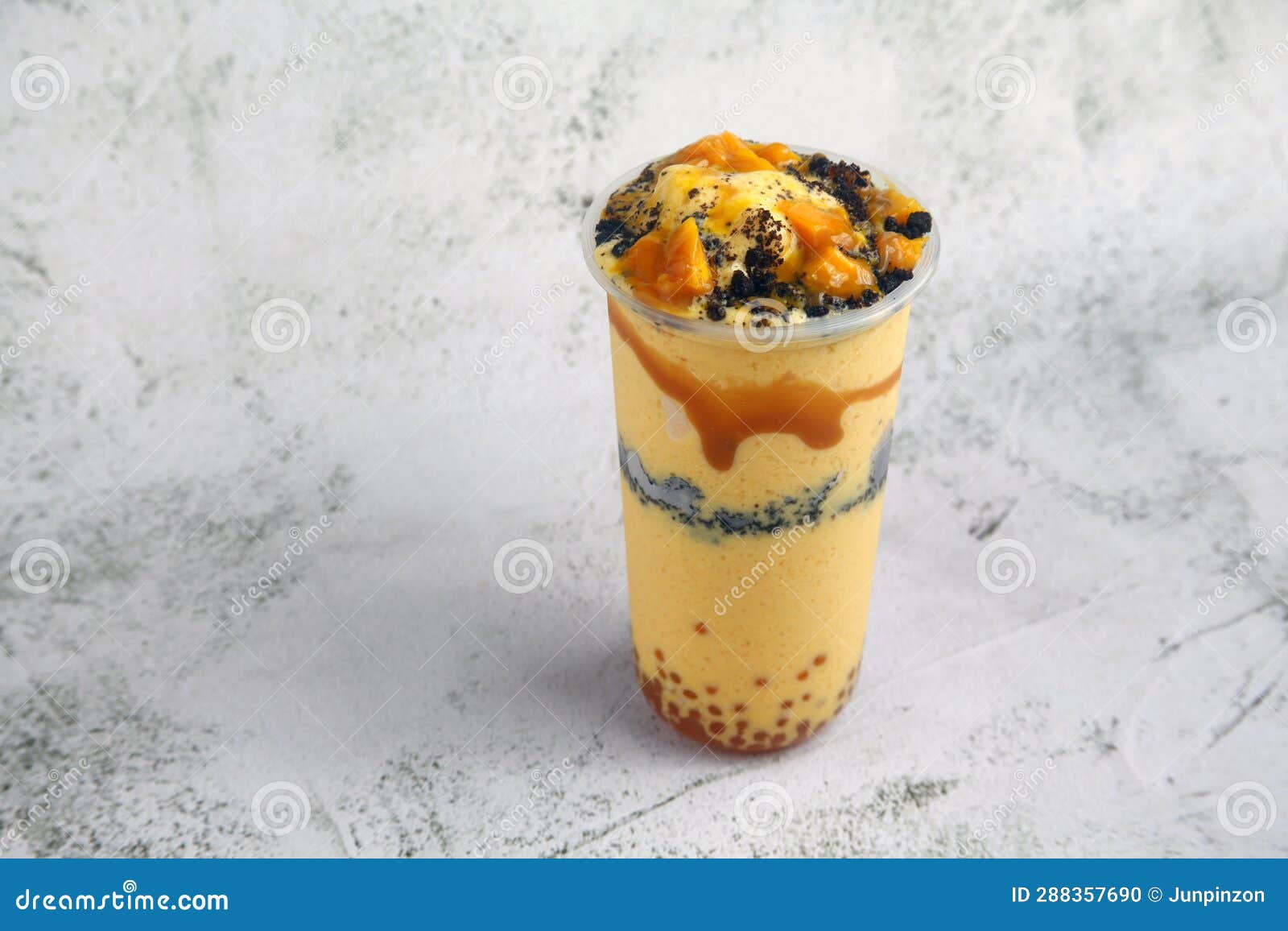 Cold Beverage Called Mango Graham Shake with Assorted Toppings Stock ...
