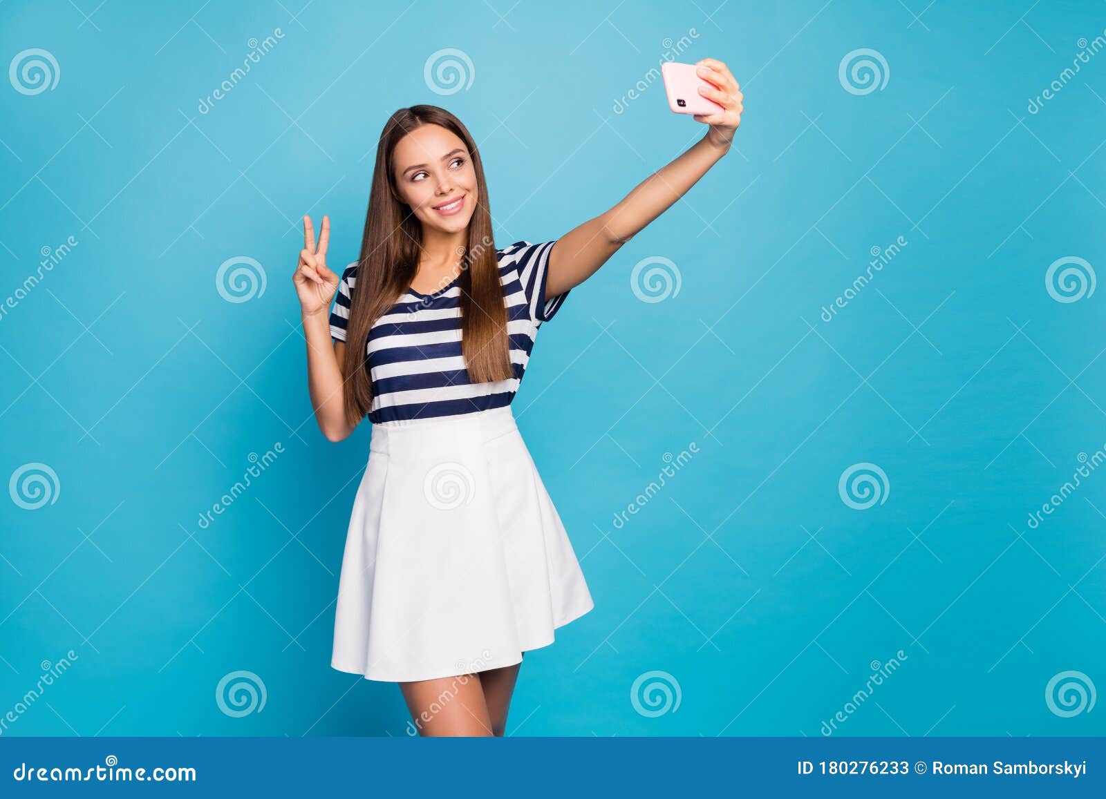 Photo Of Funny Cheerful Millennial Lady Hold Telephone Making Selfies