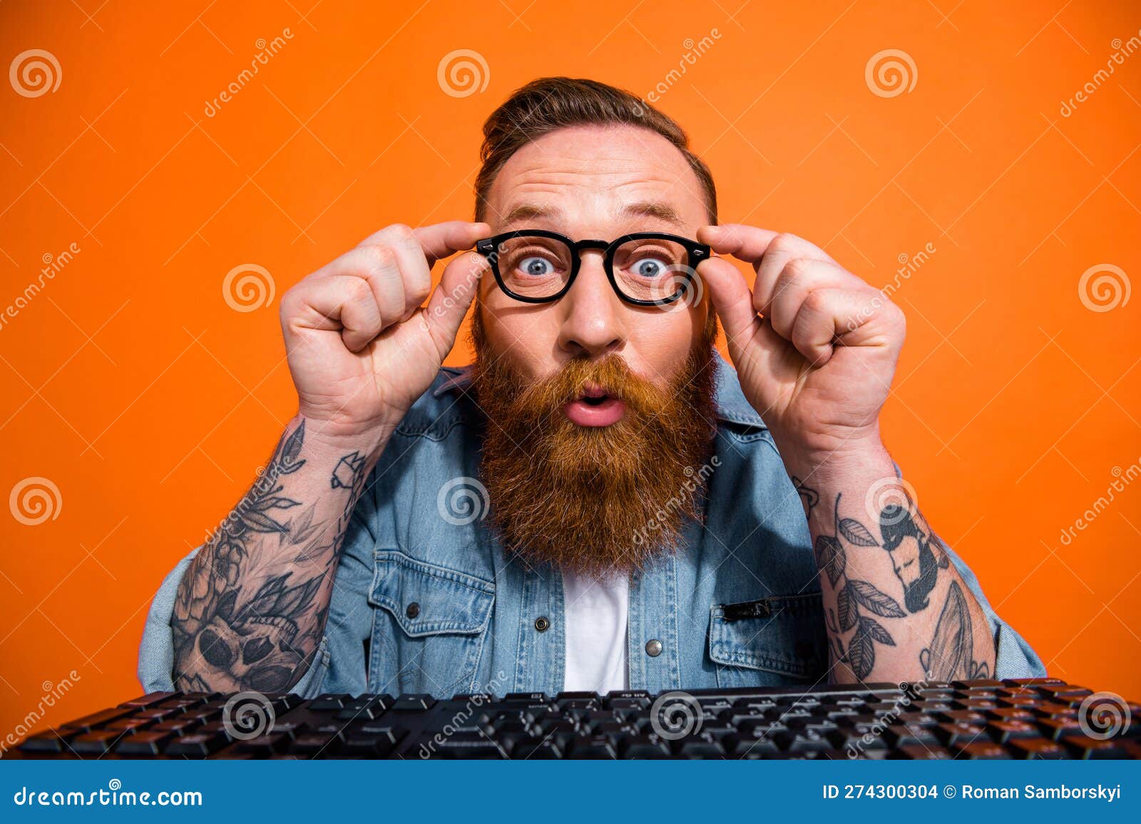 Photo Of Funny Shocked Man Wear Jeans Shirt Arms Spectacles Looking