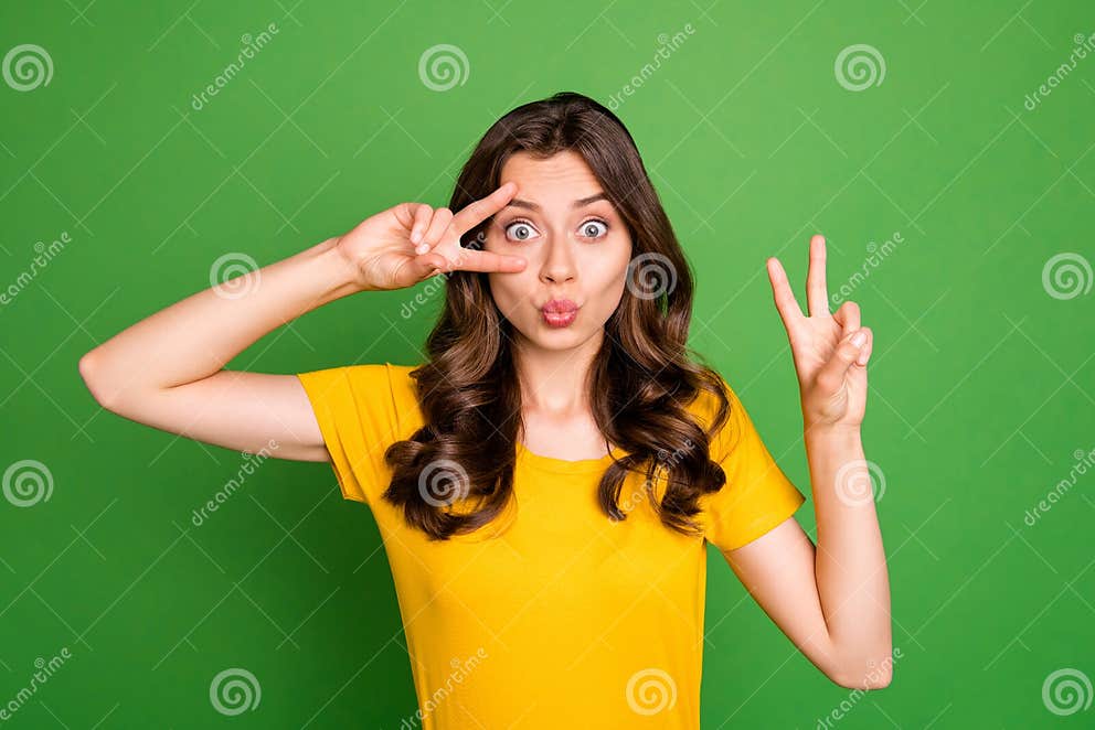 Photo Of Funny Youngster Lady Showing V Sign Symbols Both Arms Sending