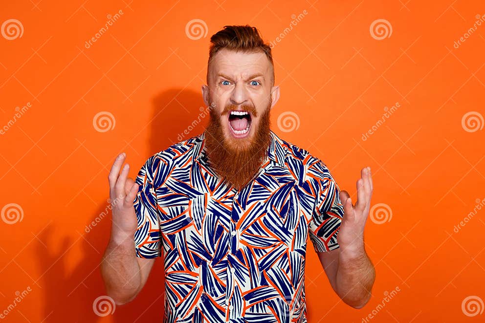 Photo Of Furious Mad Guy Dressed Print Shirt Shouting You Empty Space Isolated Orange Color