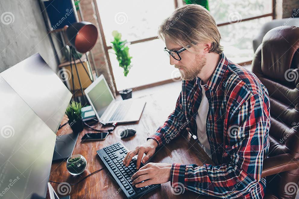 Photo of Geek Young Blond Hair Hacker Guy at Loft Design Modern Office ...
