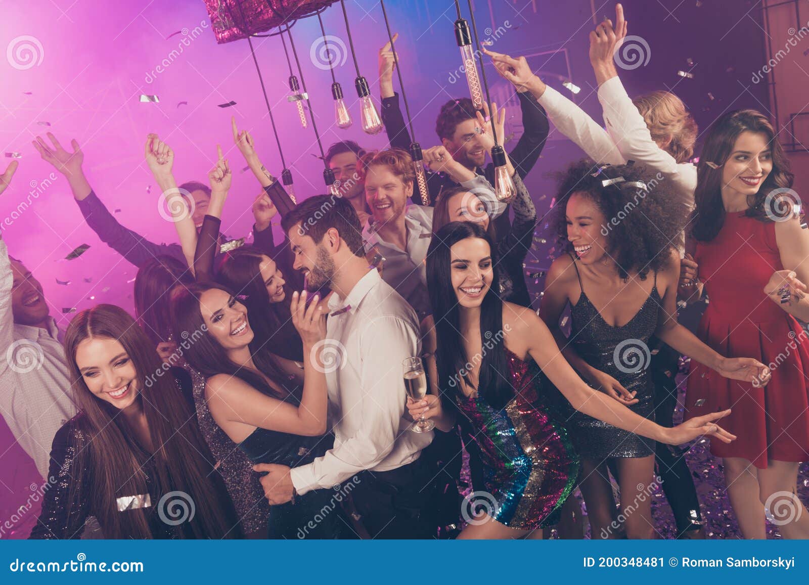 Photo Of Group Carefree Crazy People Dance Flirt Raise Hands Wear