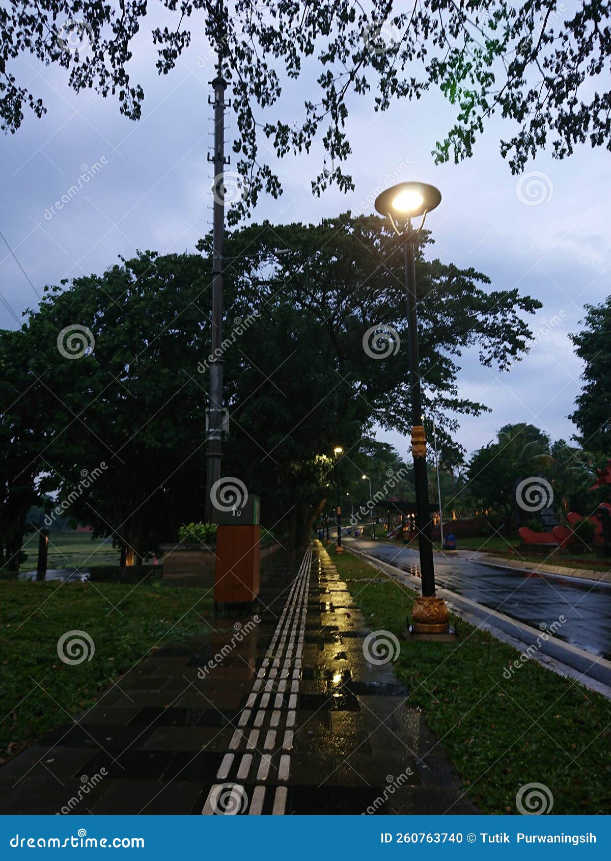 Guidance Blind at Foot Path in the Evening after Rain Stock Photo ...