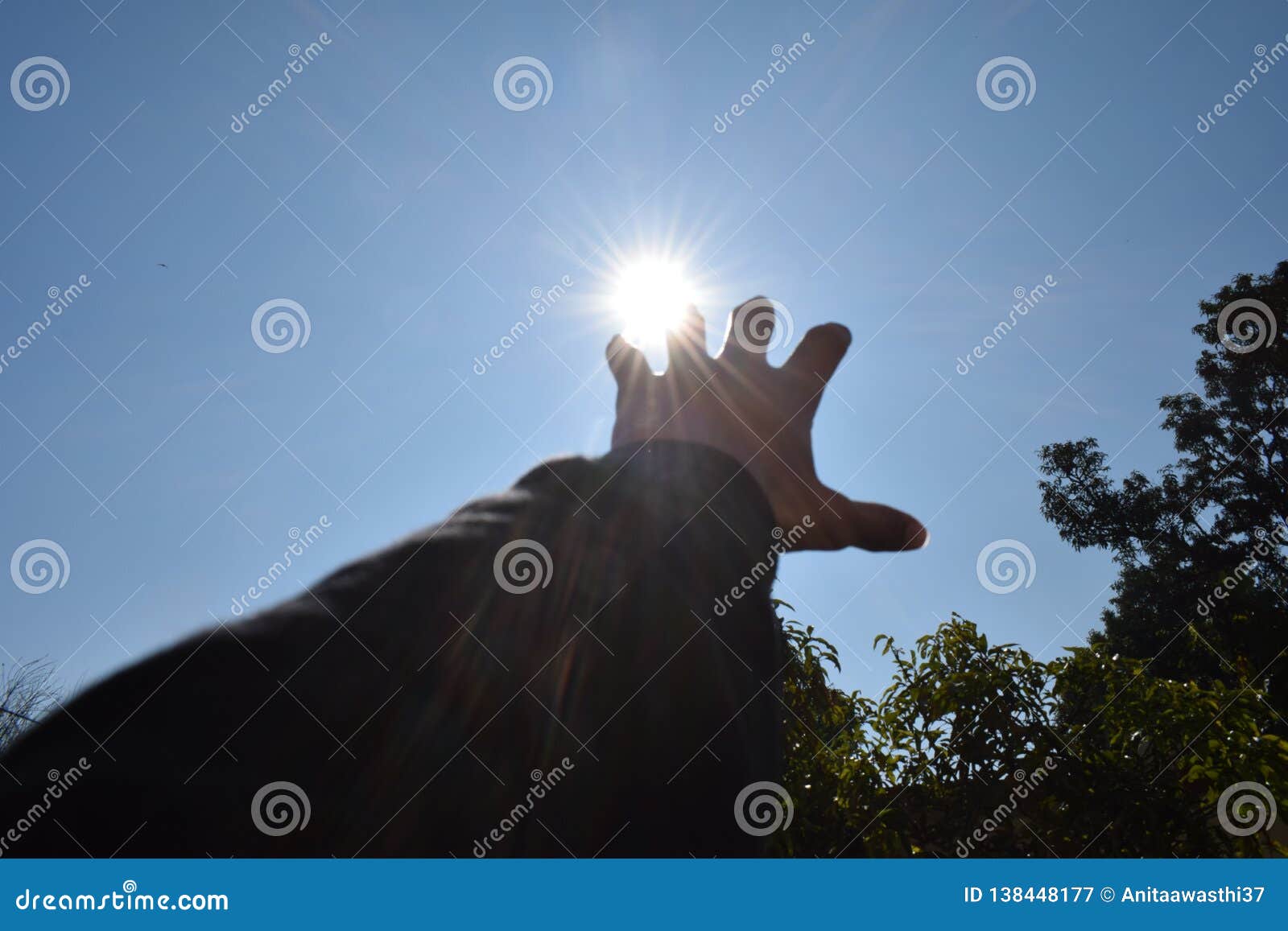 Photo of a Hand Approaching Sun. Stock Image - Image of autumn, bright ...