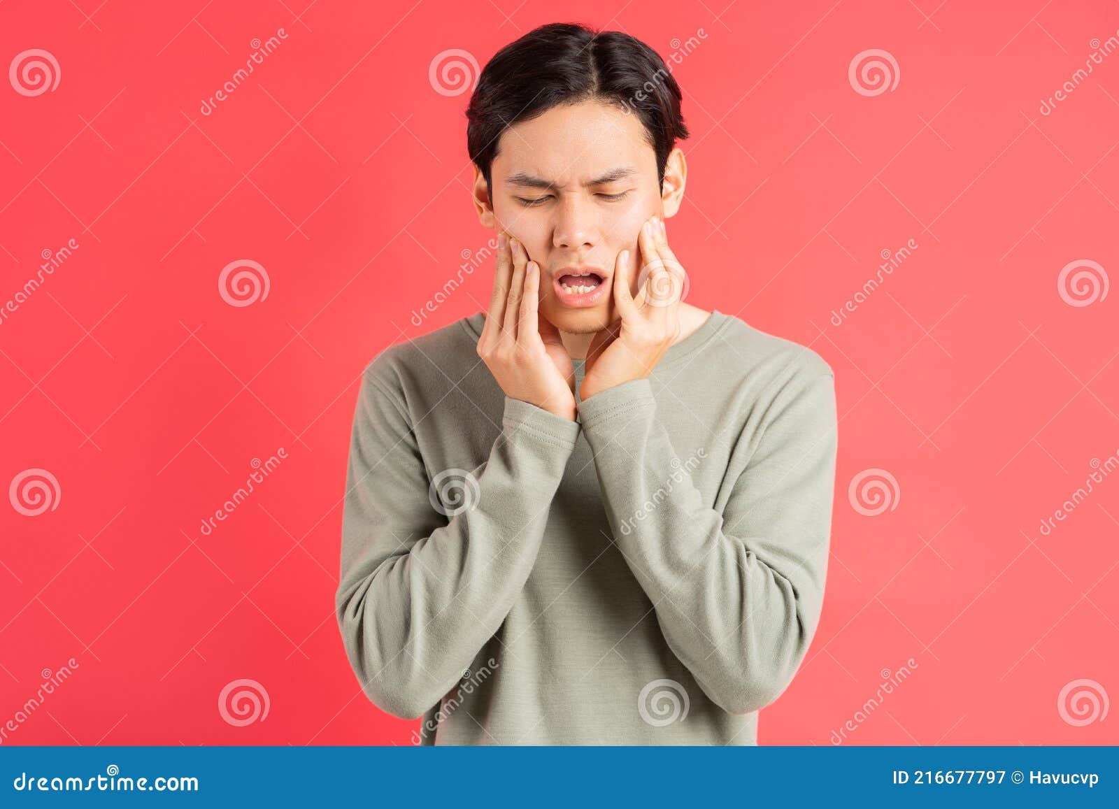 A Photo of a Handsome Asian Man Suffering from Tooth Decay Stock Image ...