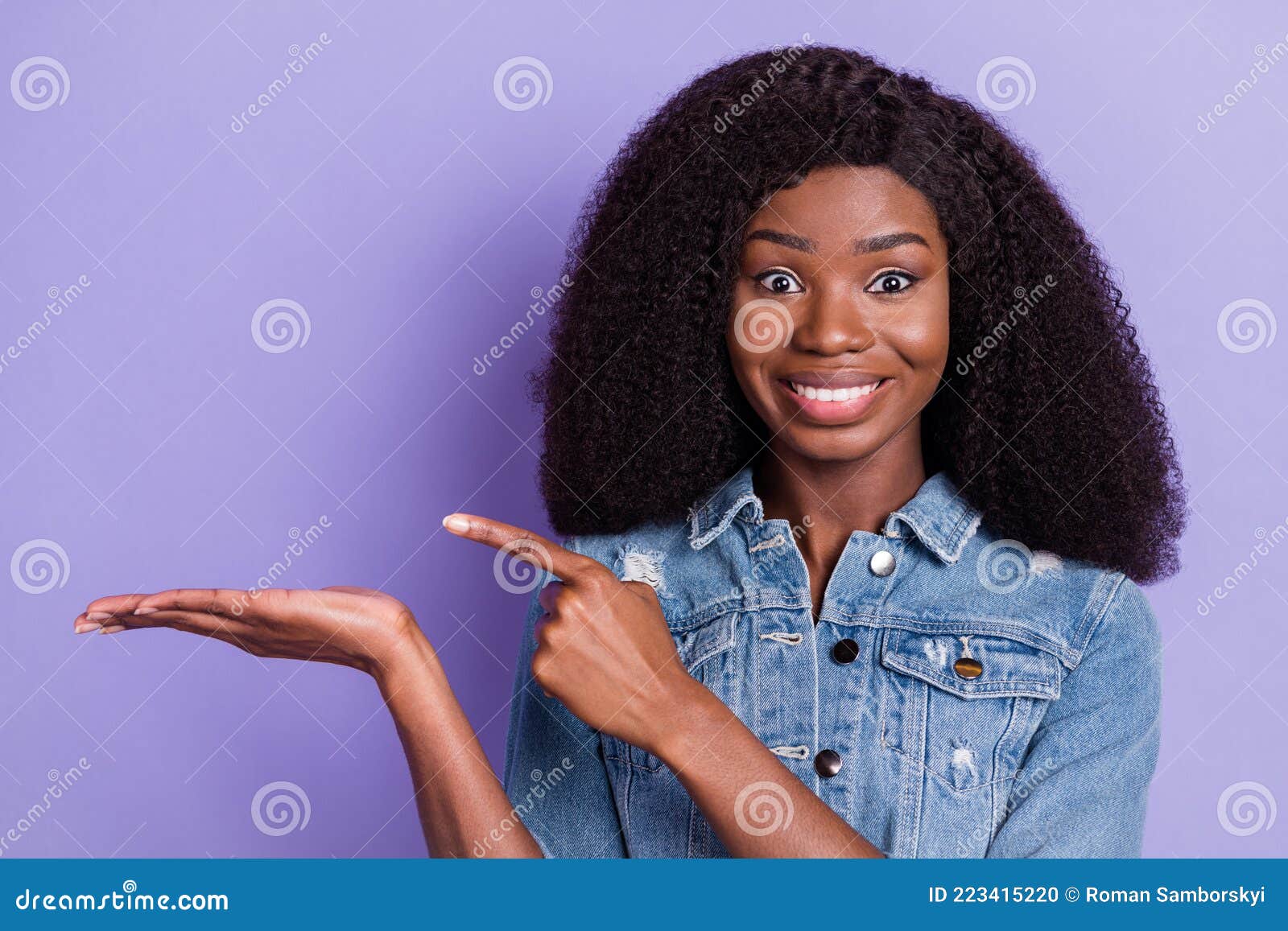 Photo Of Happy Cheerful Good Mood Smiling African Girl Point Finger