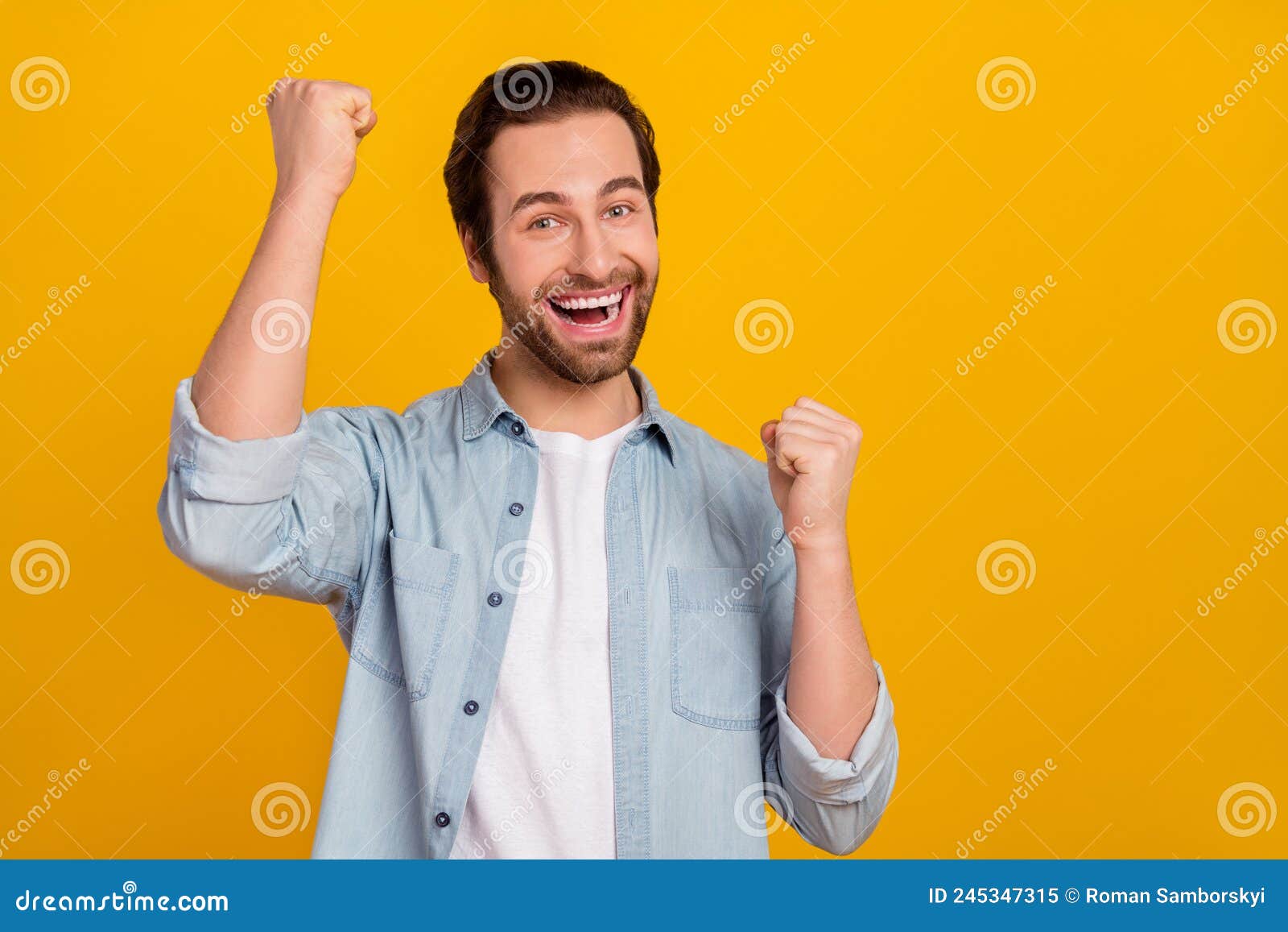Photo Of Hooray Young Brown Hairdo Guy Yell Wear Jeans Shirts Isolated