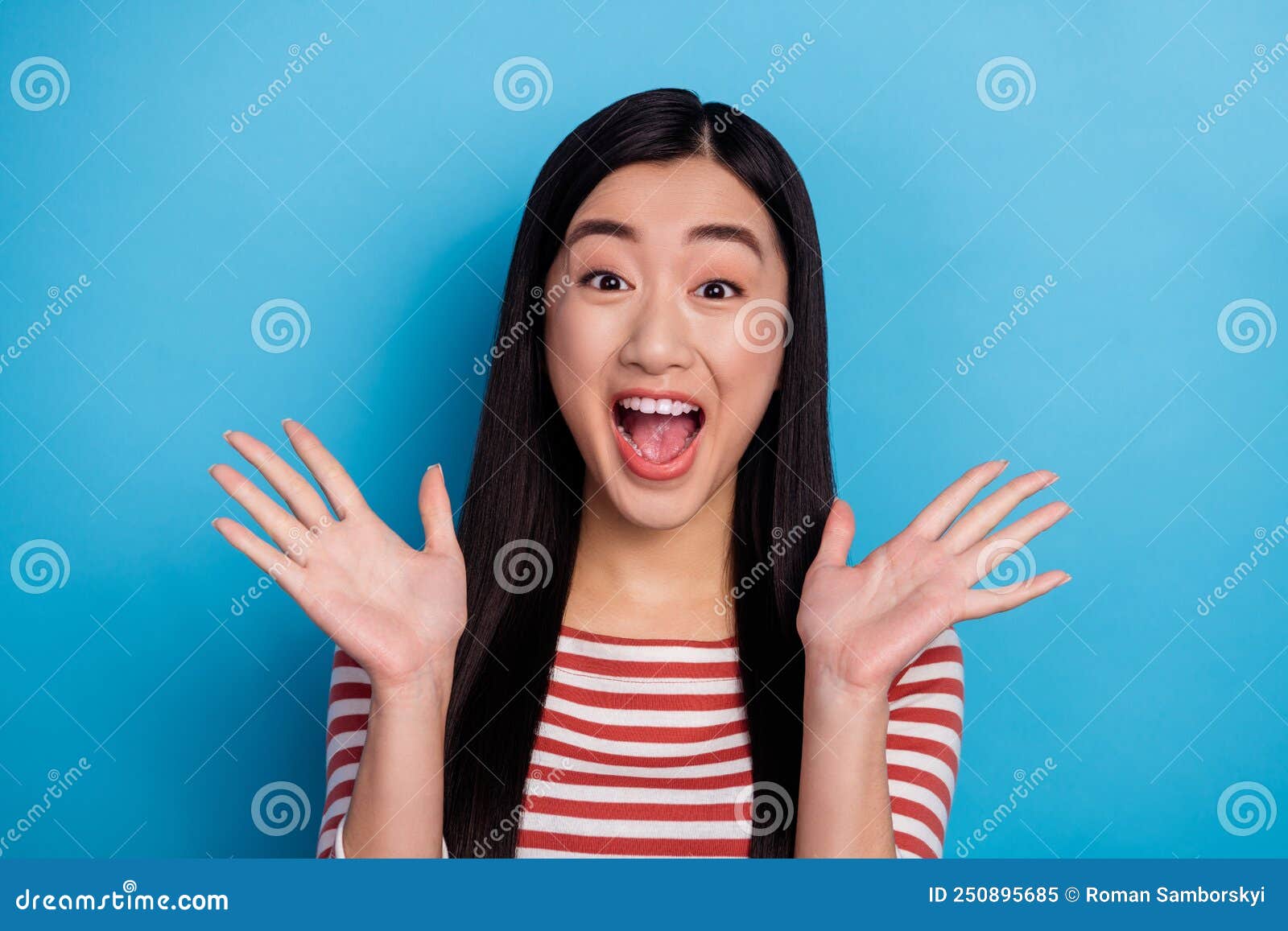 Photo Of Impressed Astonished Thai Person Raise Arms Palms Open Mouth