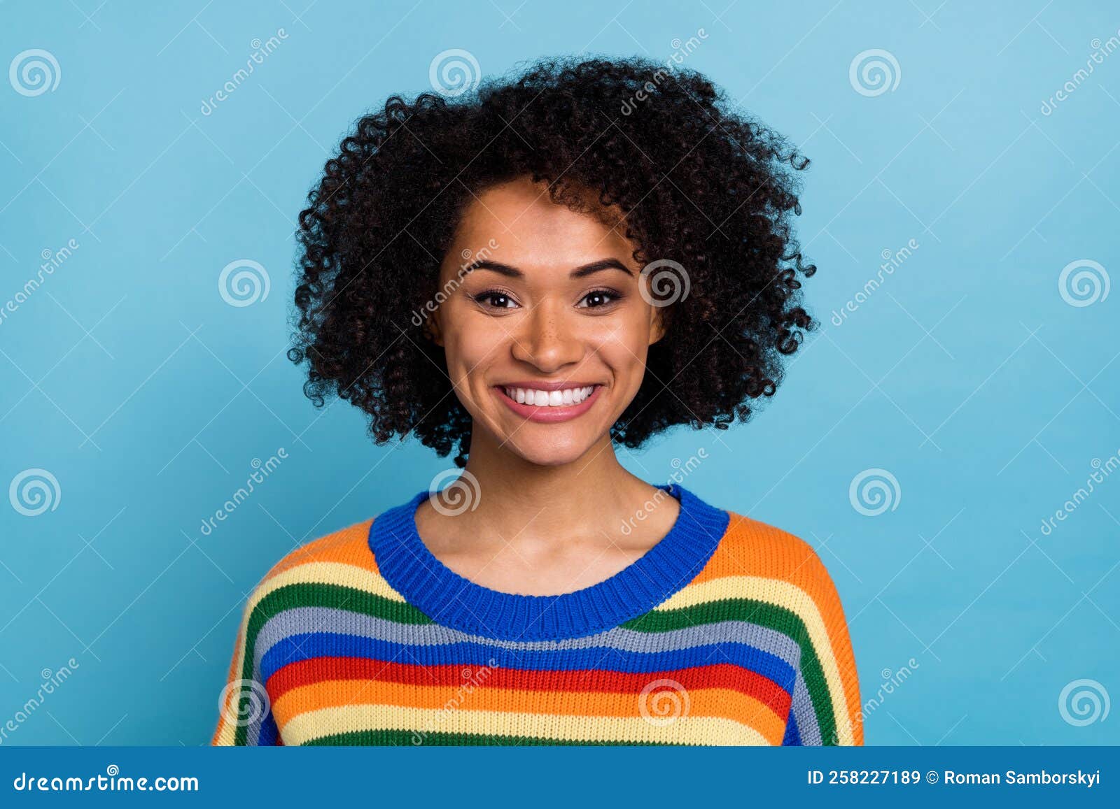 Photo Of Impressed Curly Hairdo Lady Wear Colorful Sweater Isolated On