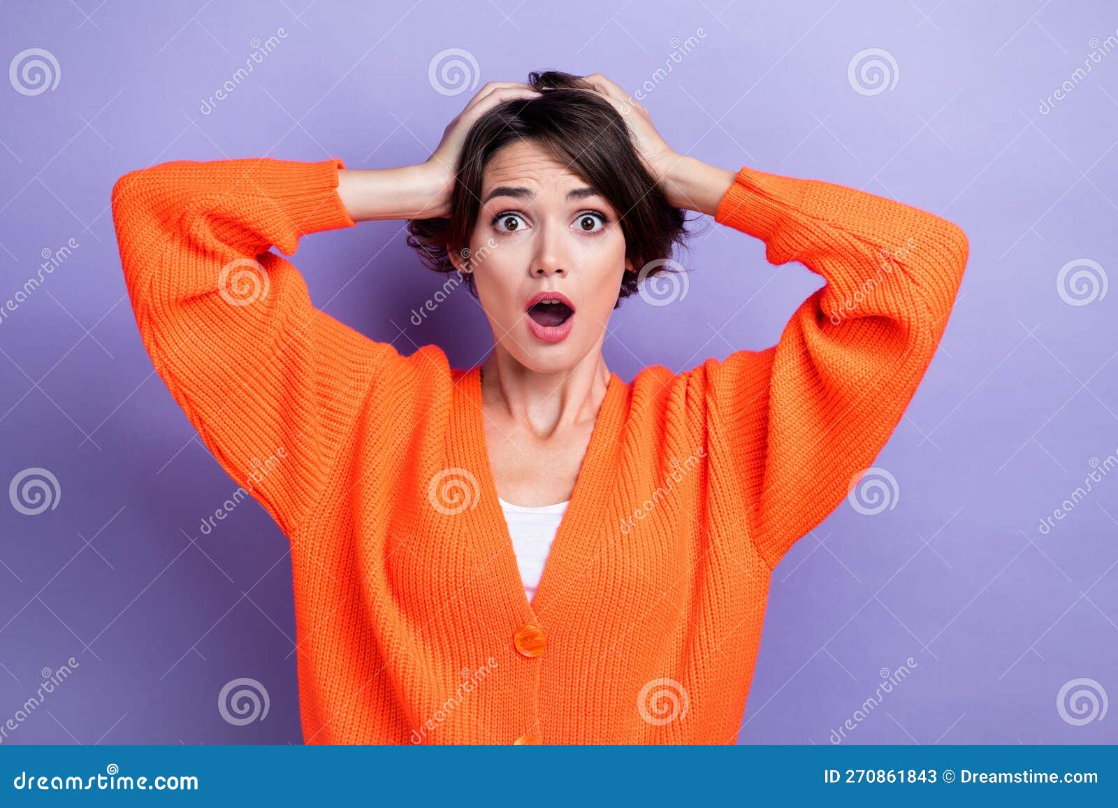 Photo Of Impressed Funny Woman Wear Orange Cardigan Arms Head Open