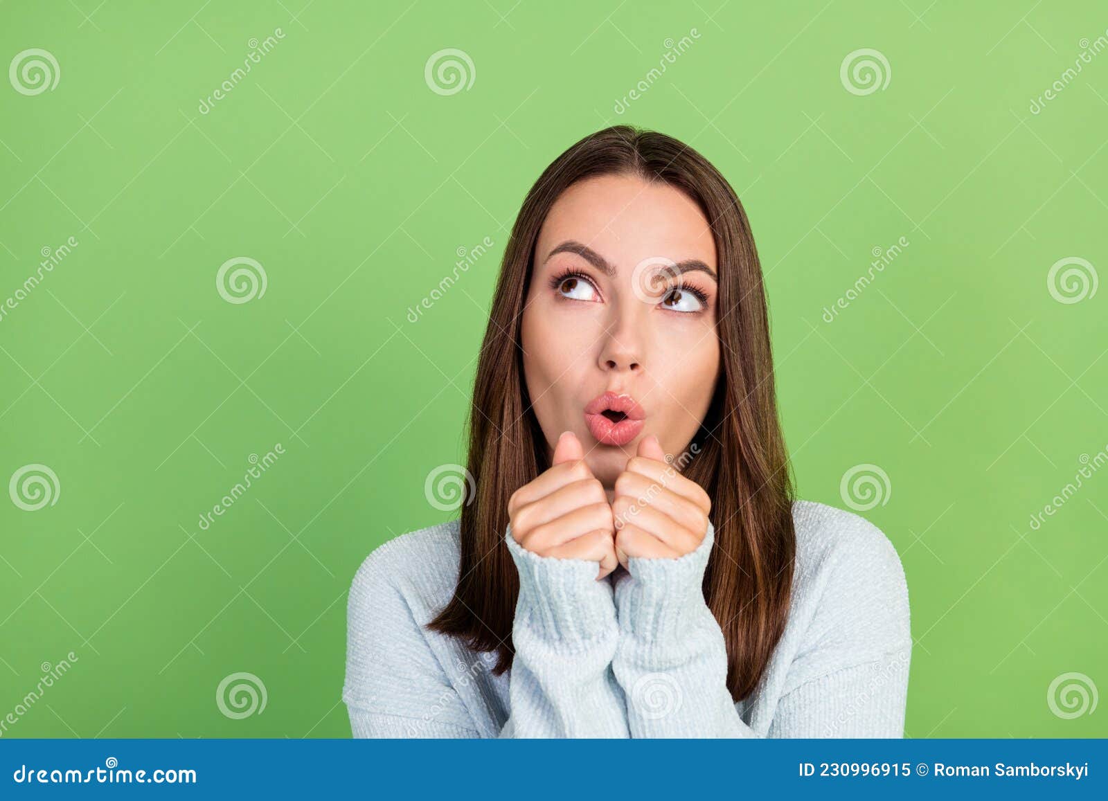 Photo Of Impressed Millennial Brunette Lady Fists Face Look Wear Jumper