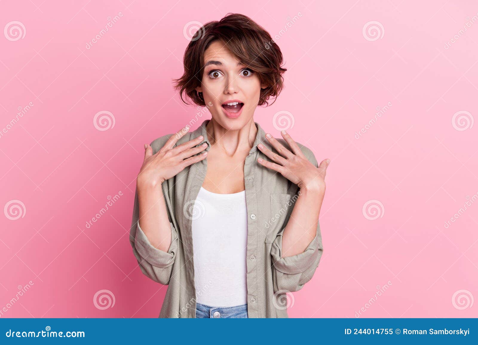 Photo Of Impressed Millennial Brunette Lady Look Camera Wear Outfit